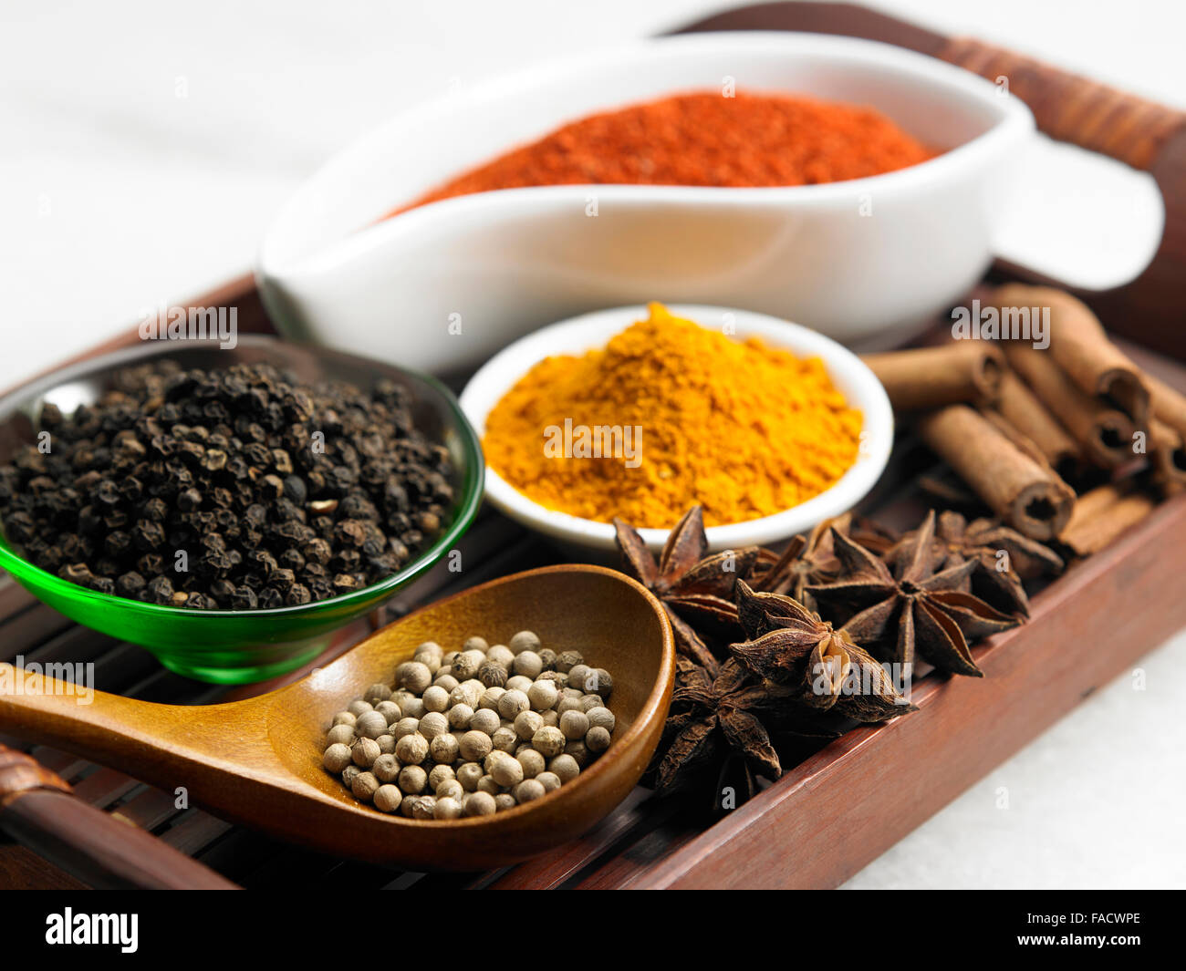 few asian spices on the tray Stock Photo - Alamy