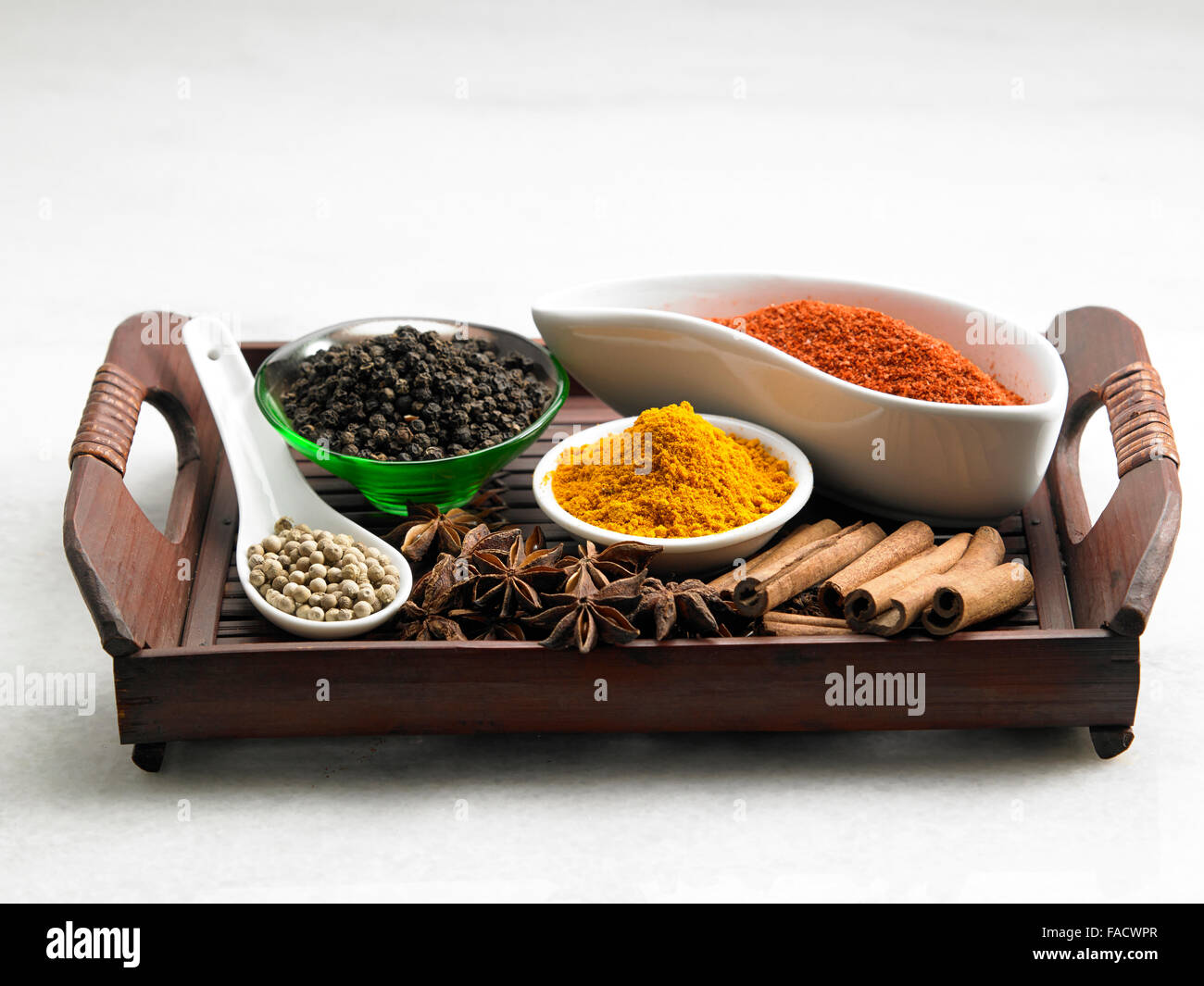few asian spices on the tray Stock Photo - Alamy