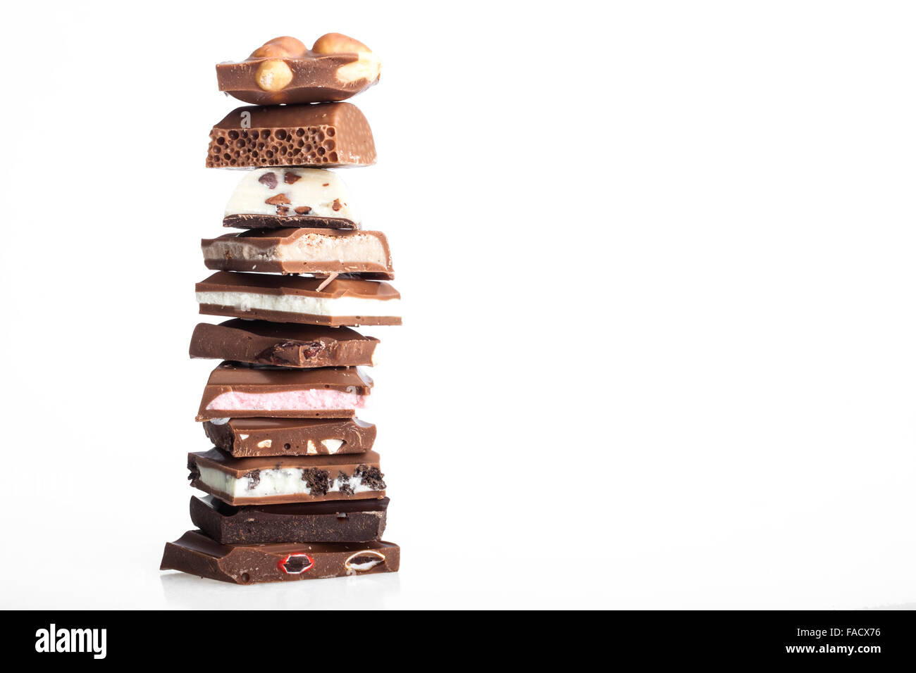 Chocolate stack on white background Stock Photo - Alamy