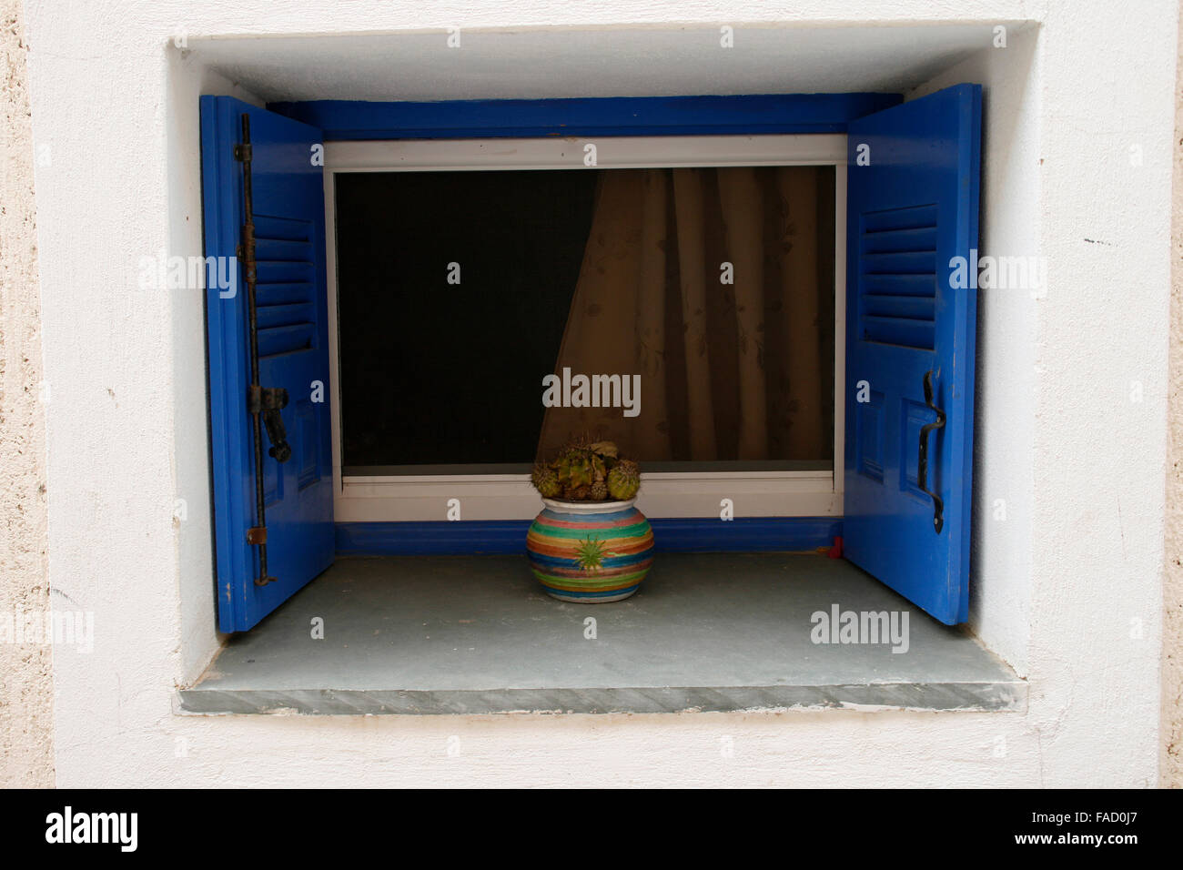 Greek Style windows - blue and white window Stock Photo - Alamy