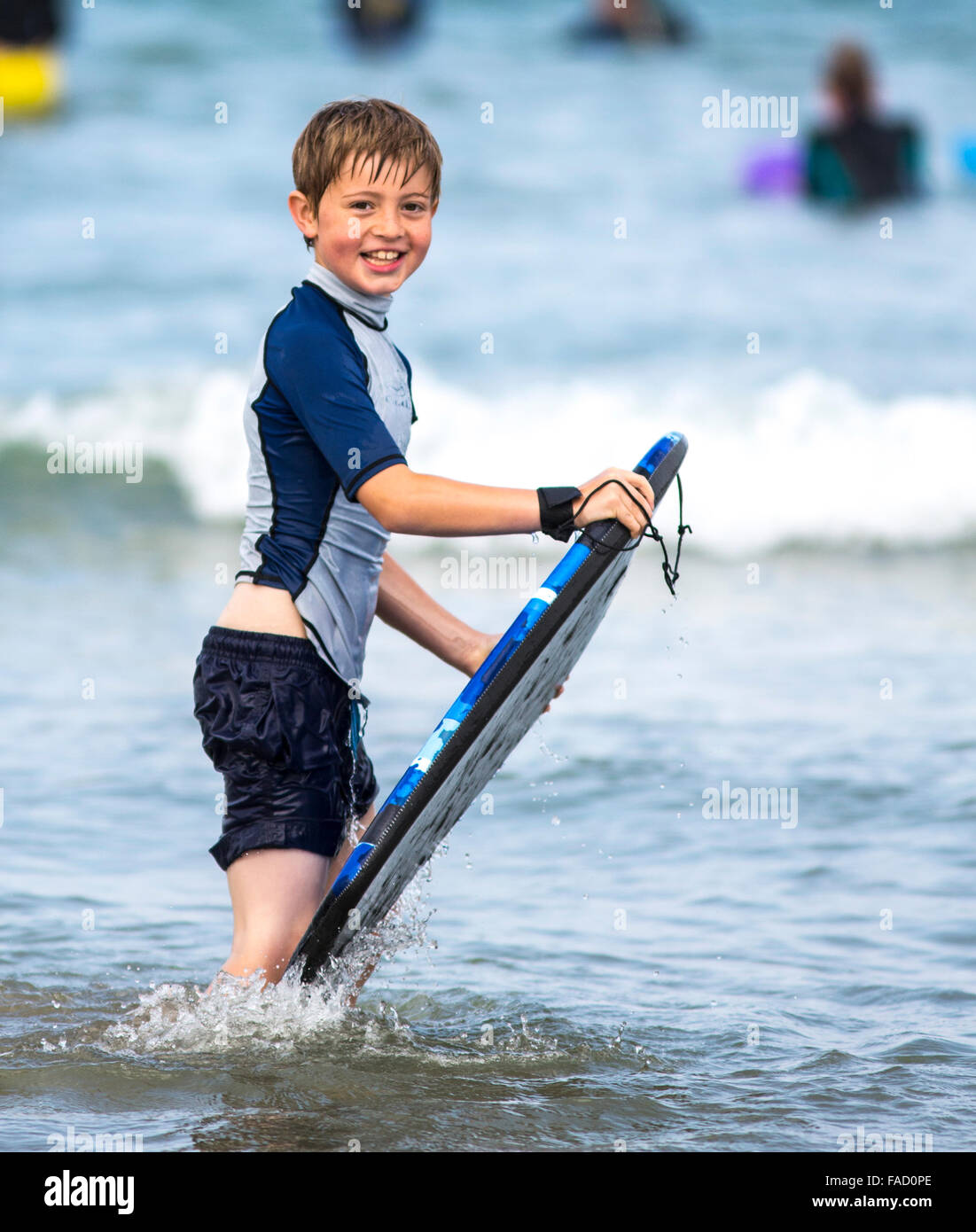 Beautiful young boy at the beach hi-res stock photography and images ...