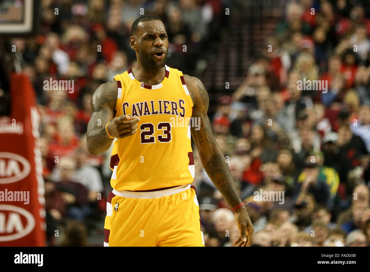 Portland, Oregon, USA. 26th December, 2015. LEBRON JAMES (23) disputes ...