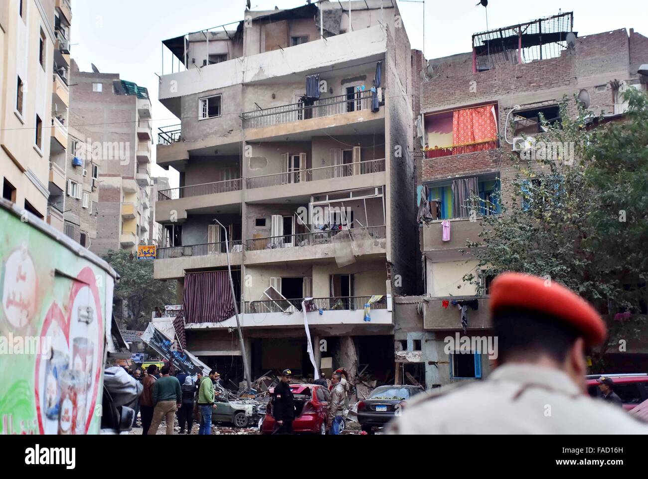 Cairo, Egypt. 27th Dec, 2015. Egyptian security forces and passersby ...