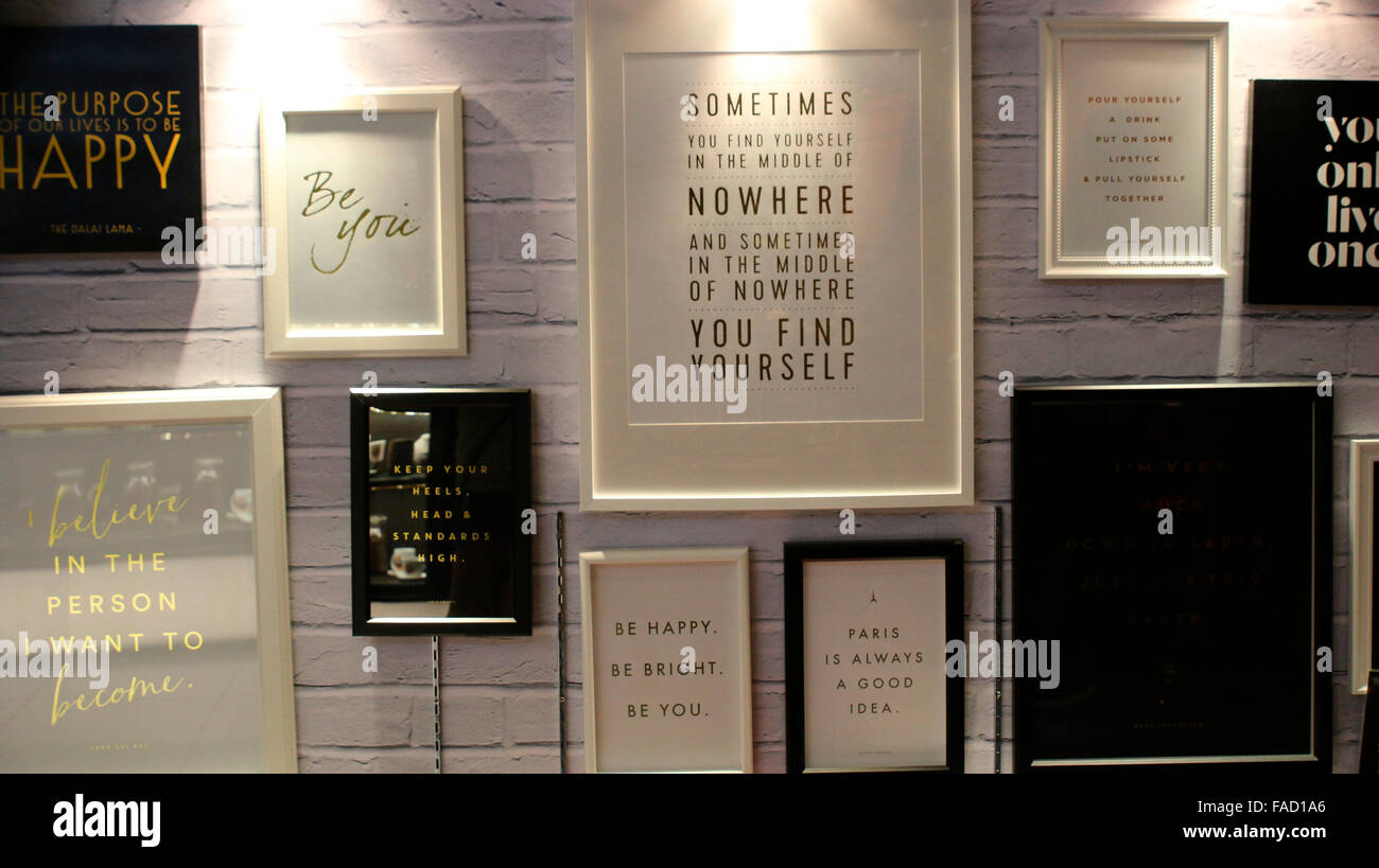Framed quotes at a retail store Stock Photo - Alamy