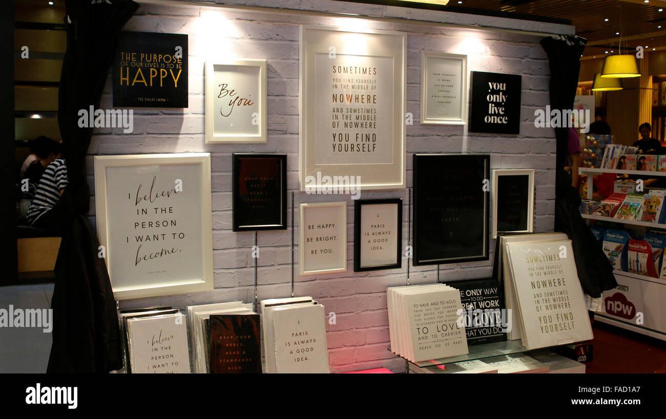 Framed quotes at a retail store Stock Photo - Alamy