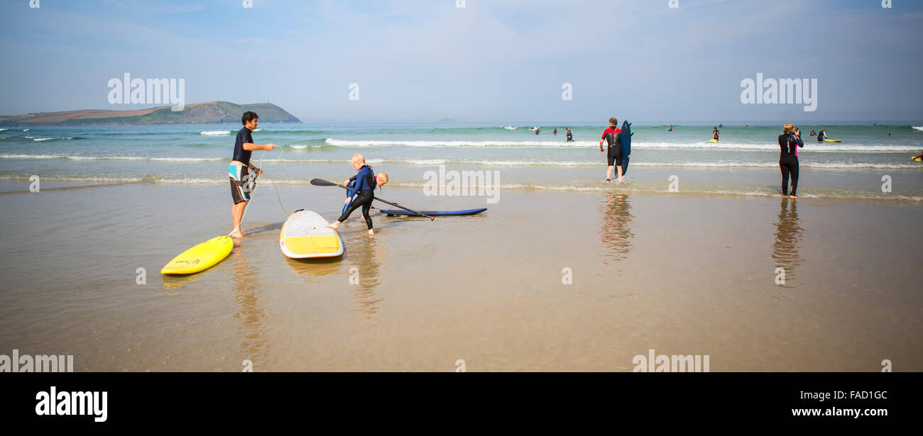 Surfers on Polzeath Beach in Cornwall, England, United Kingdom Stock ...