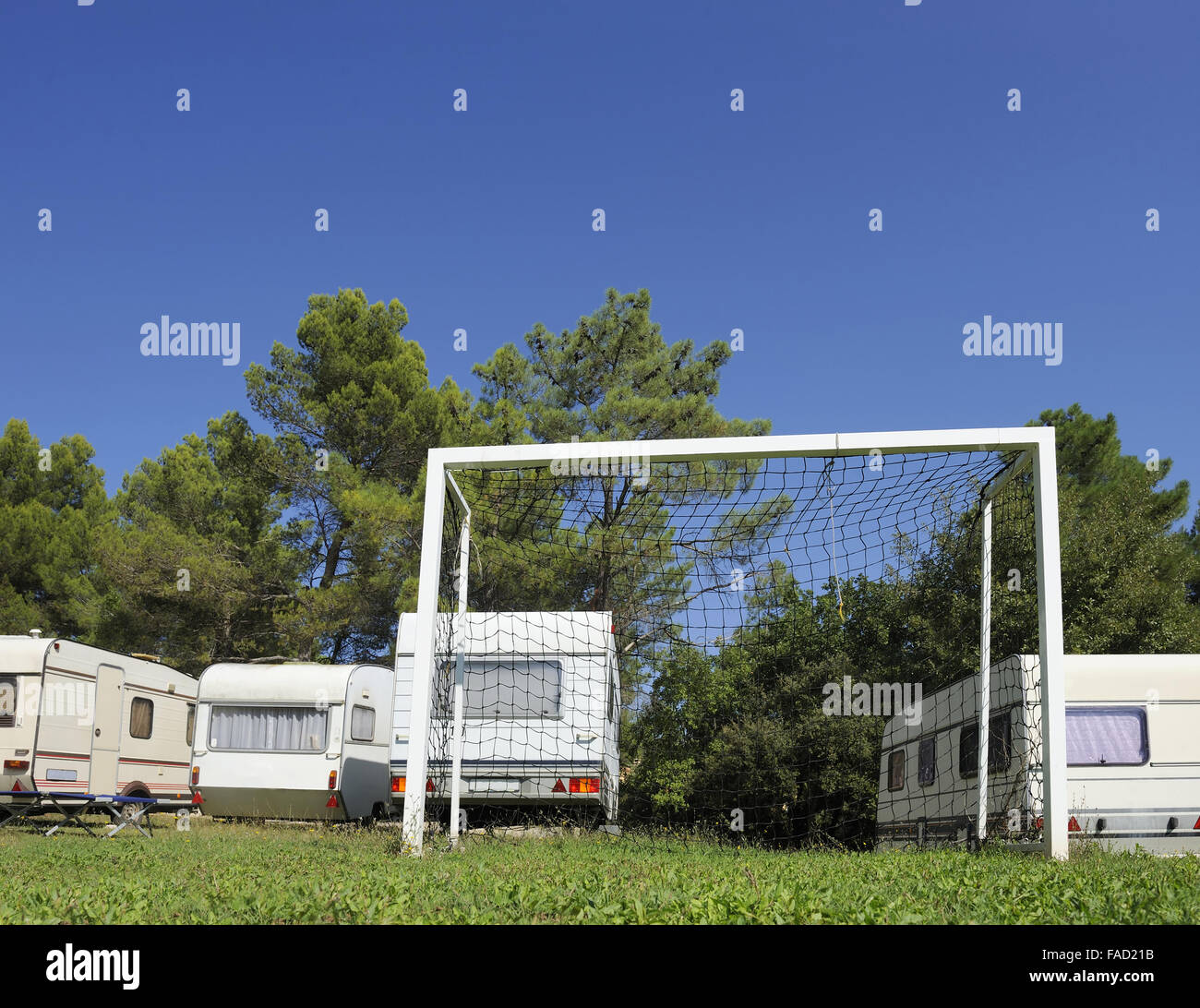 Caravans at a camping in France parked behind a soccer goal Stock Photo ...