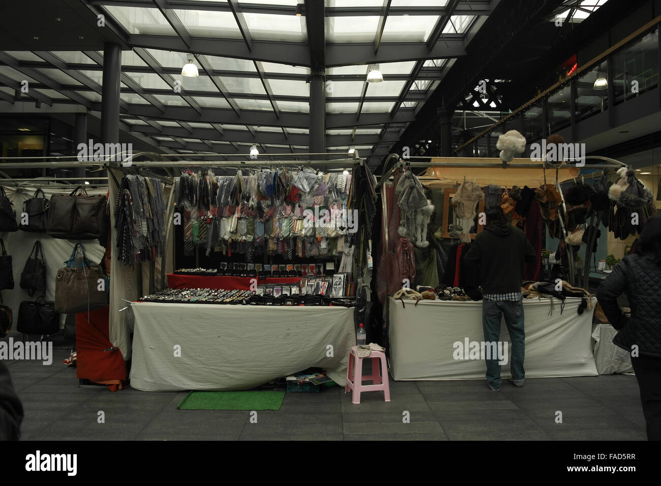 1 person standing market hall right foreground hi-res stock photography ...