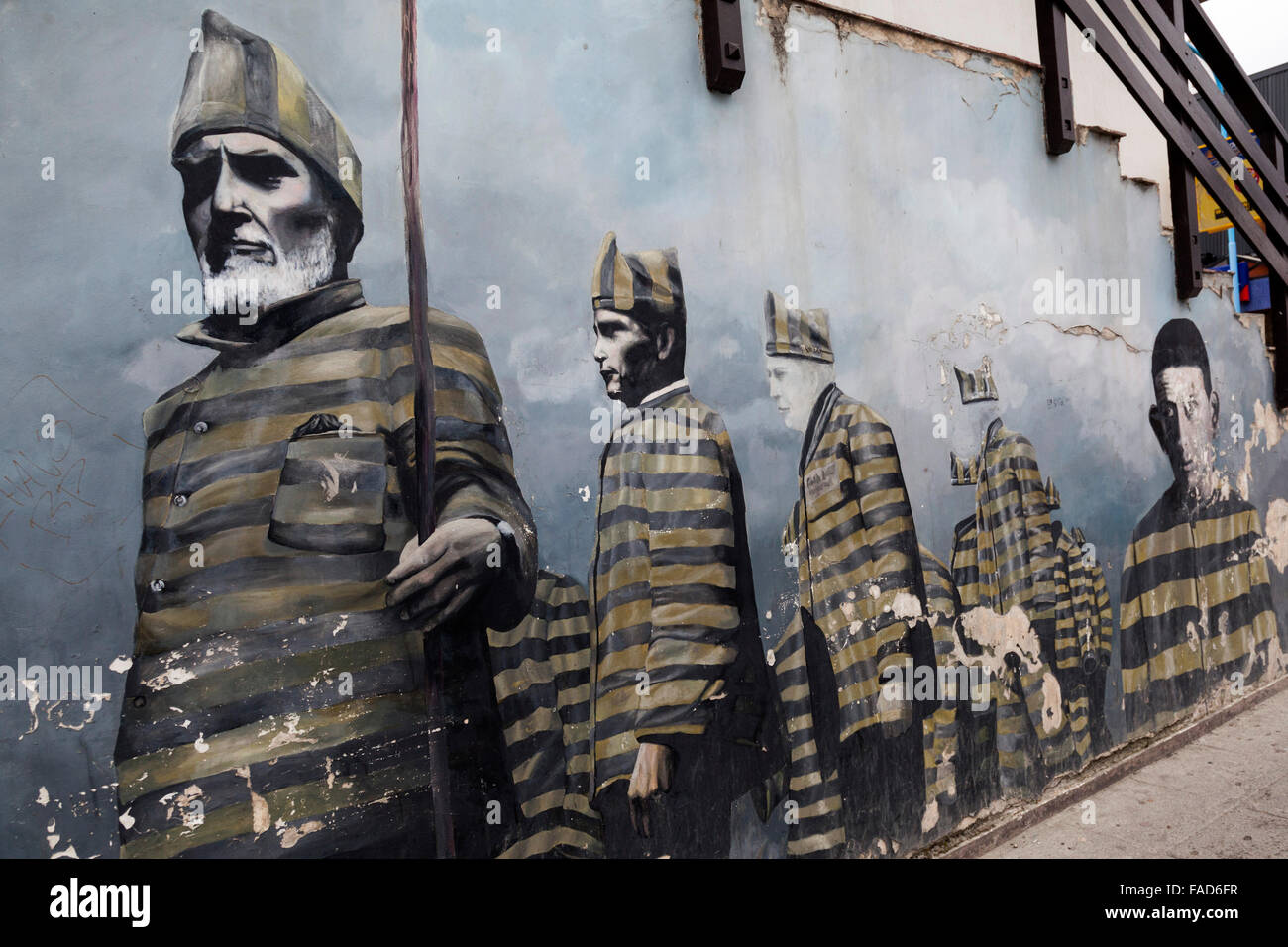 Mural of prisoners in their uniforms on the facade of the Post Office ...