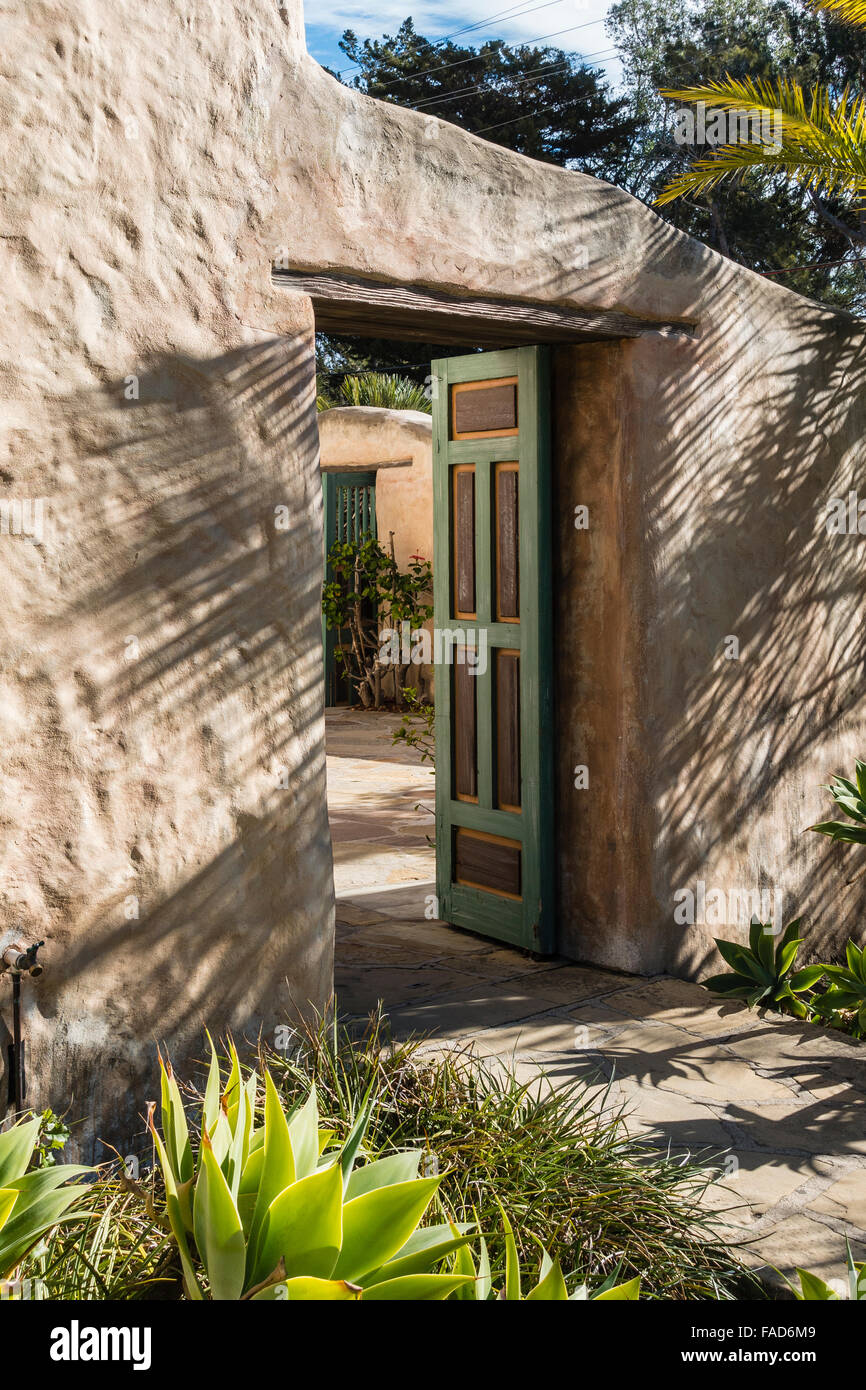 Exterior detail of painted doorway leading to a patio at Our Lady of Mt ...