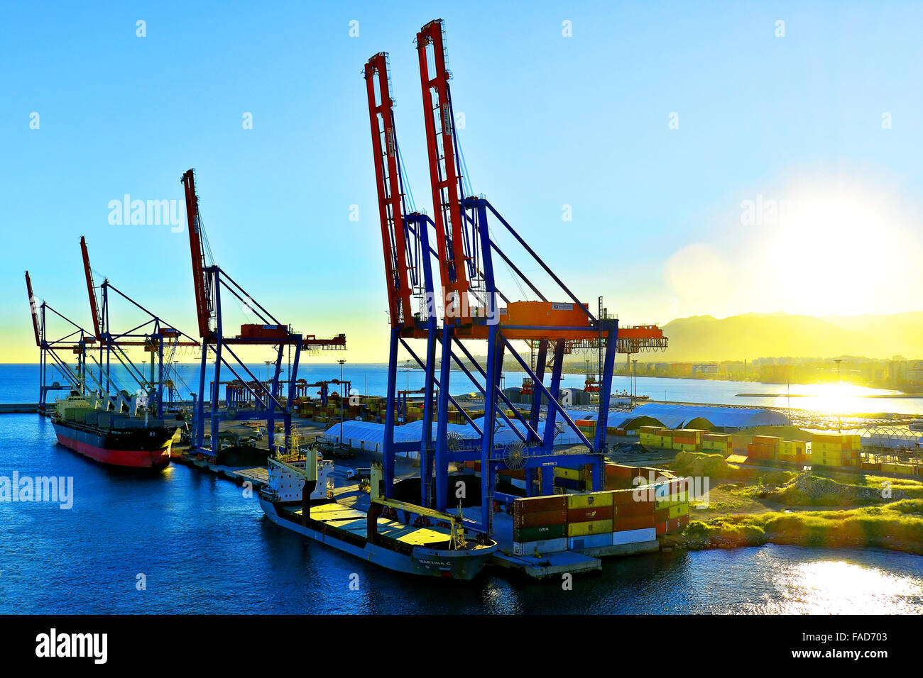 Malaga Spain industrial harbour container dock cranes Stock Photo - Alamy