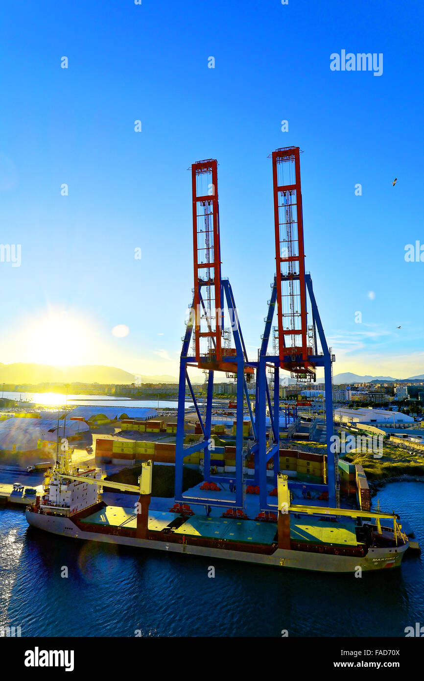 Malaga Spain industrial harbour container dock cranes Stock Photo - Alamy