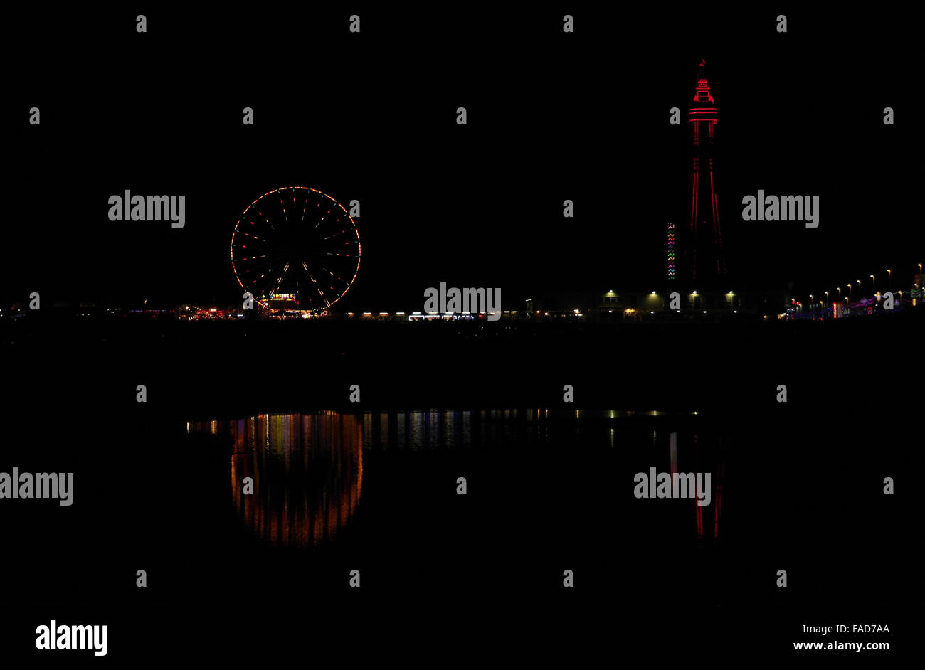 Night beach view, with reflections, north to Central Pier 'Big Wheel ...