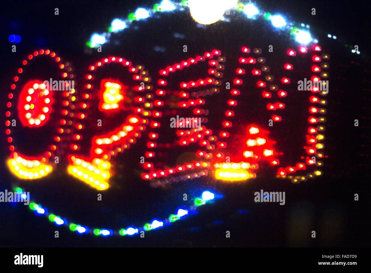 Neon shop open store sign at night in street photo Stock Photo - Alamy