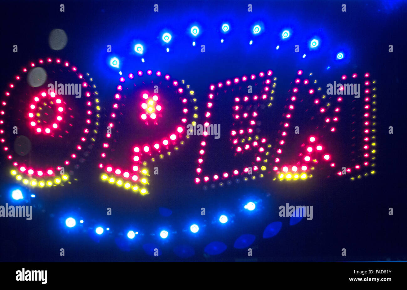 Neon shop open store sign at night in street photo Stock Photo - Alamy