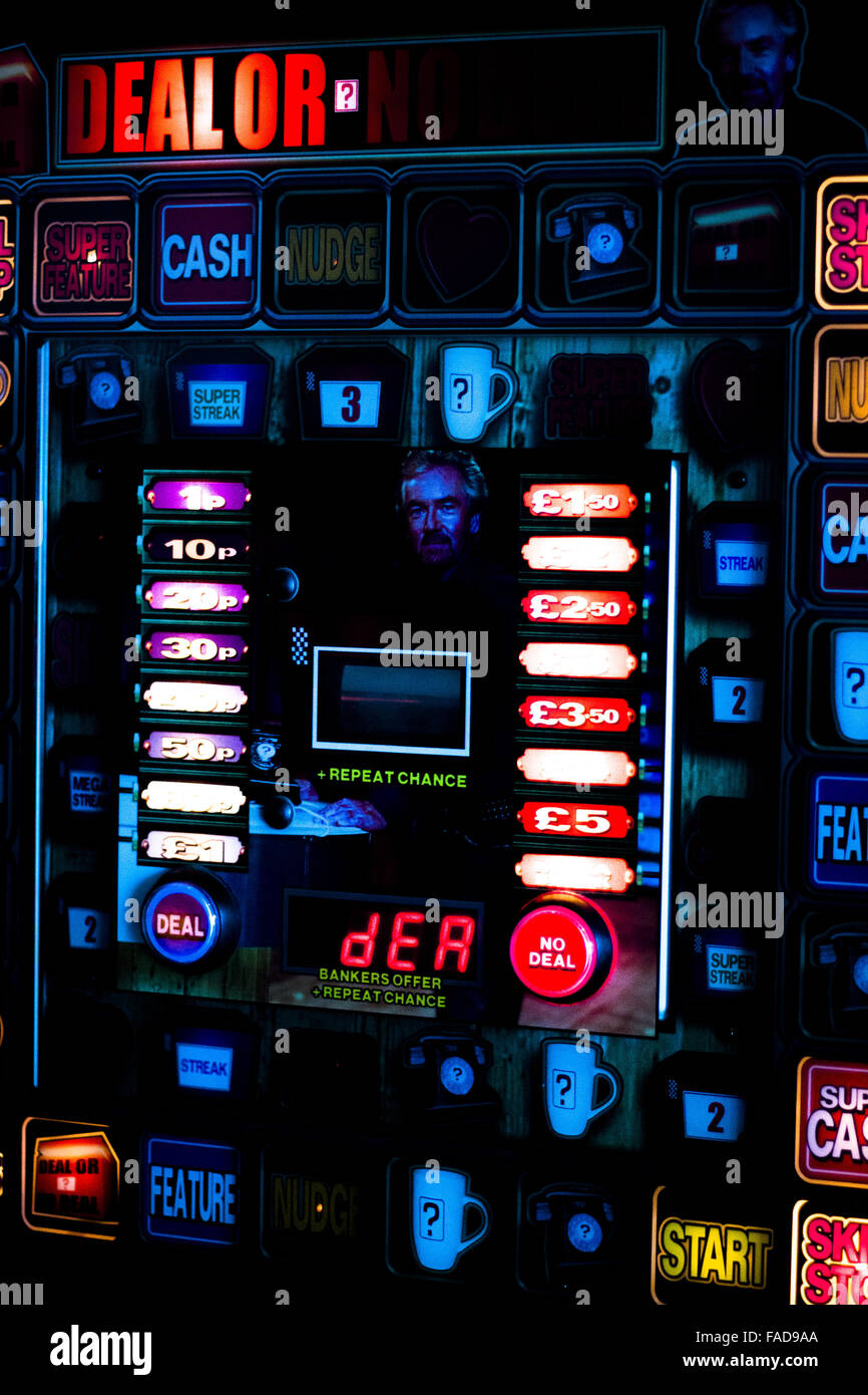 One arm bandit slot machine in casino at night photograph Stock Photo ...