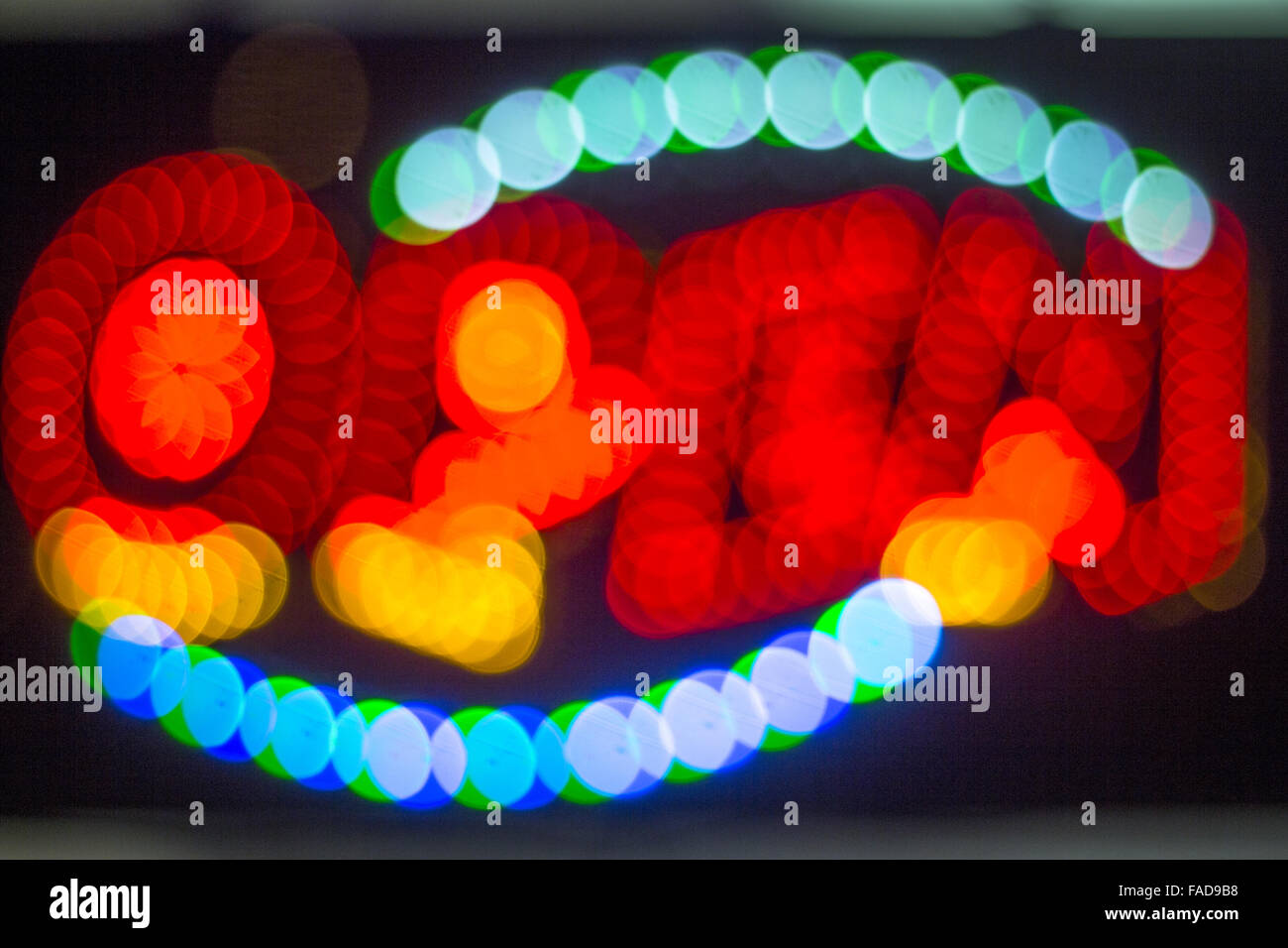 Neon shop open store sign at night in street photo Stock Photo - Alamy