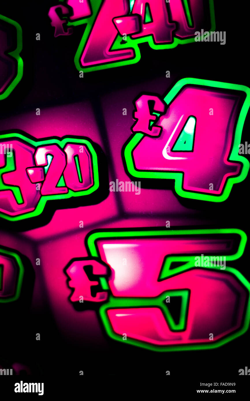 One arm bandit slot machine reels showing numbers in casino at night ...