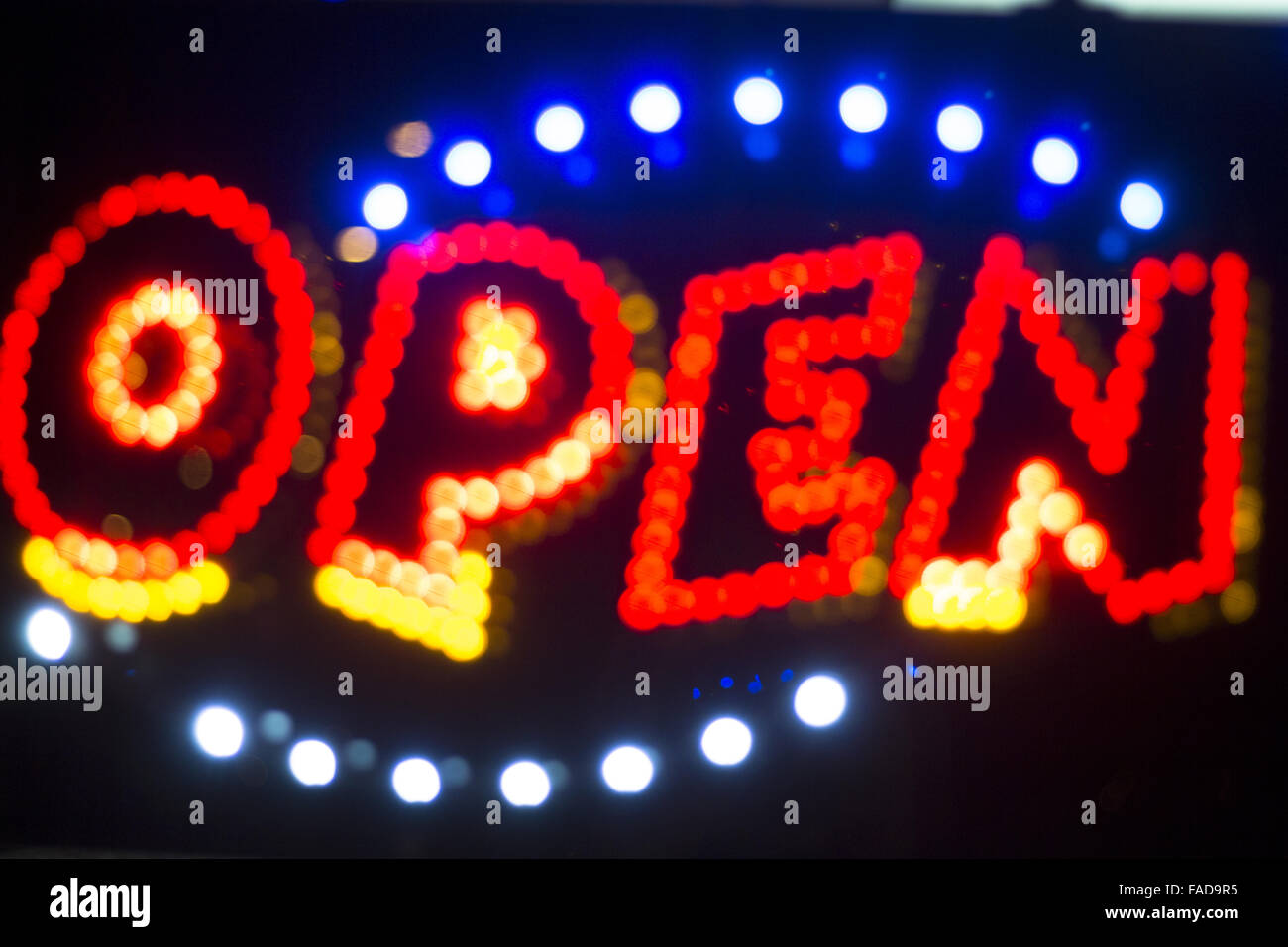 Neon shop open store sign at night in street photo Stock Photo - Alamy