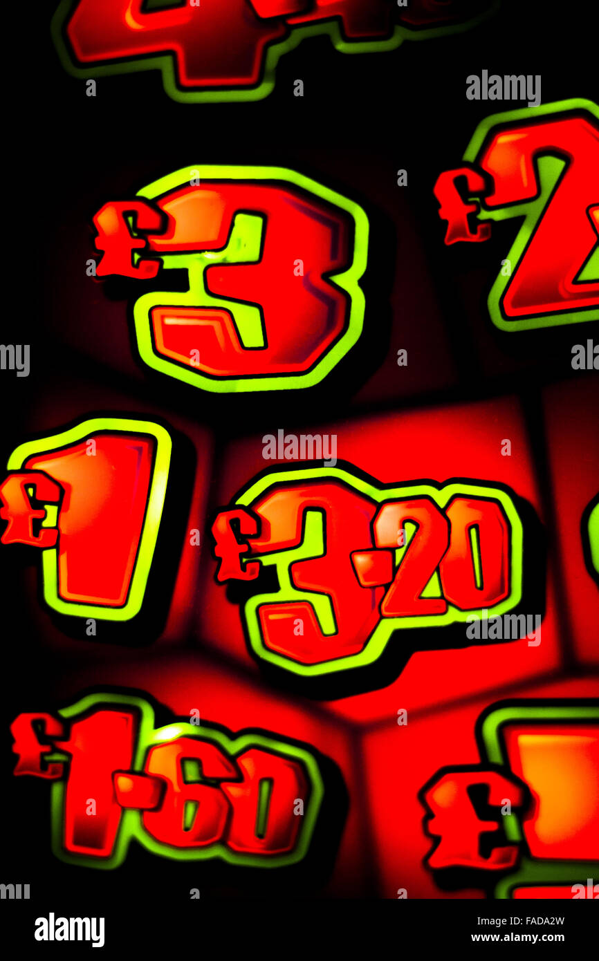 One arm bandit slot machine reels showing numbers in casino at night ...