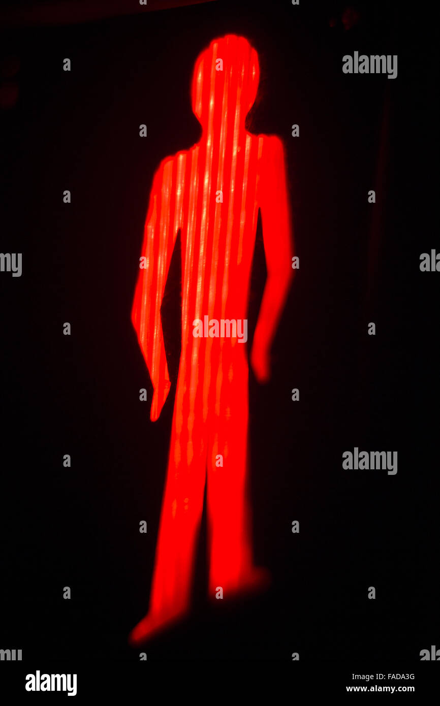 Green man go pedestrian traffic light sign Stock Photo - Alamy