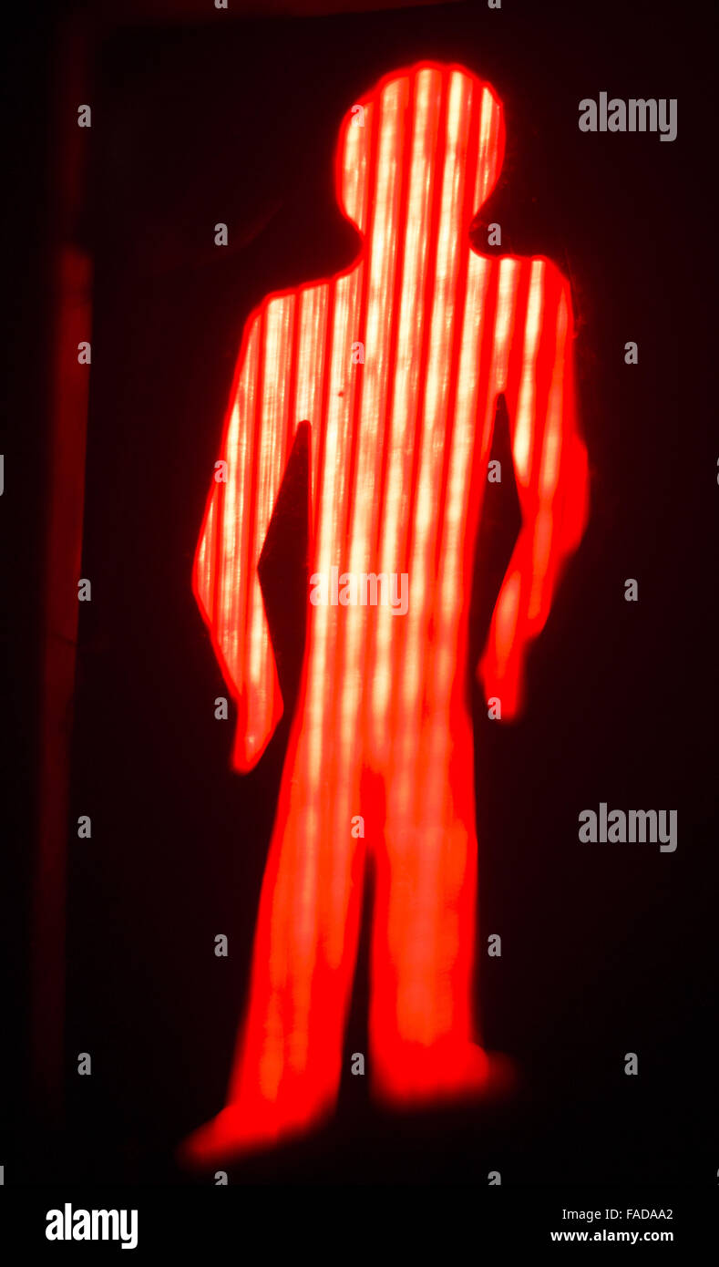 Green man go pedestrian traffic light sign Stock Photo - Alamy