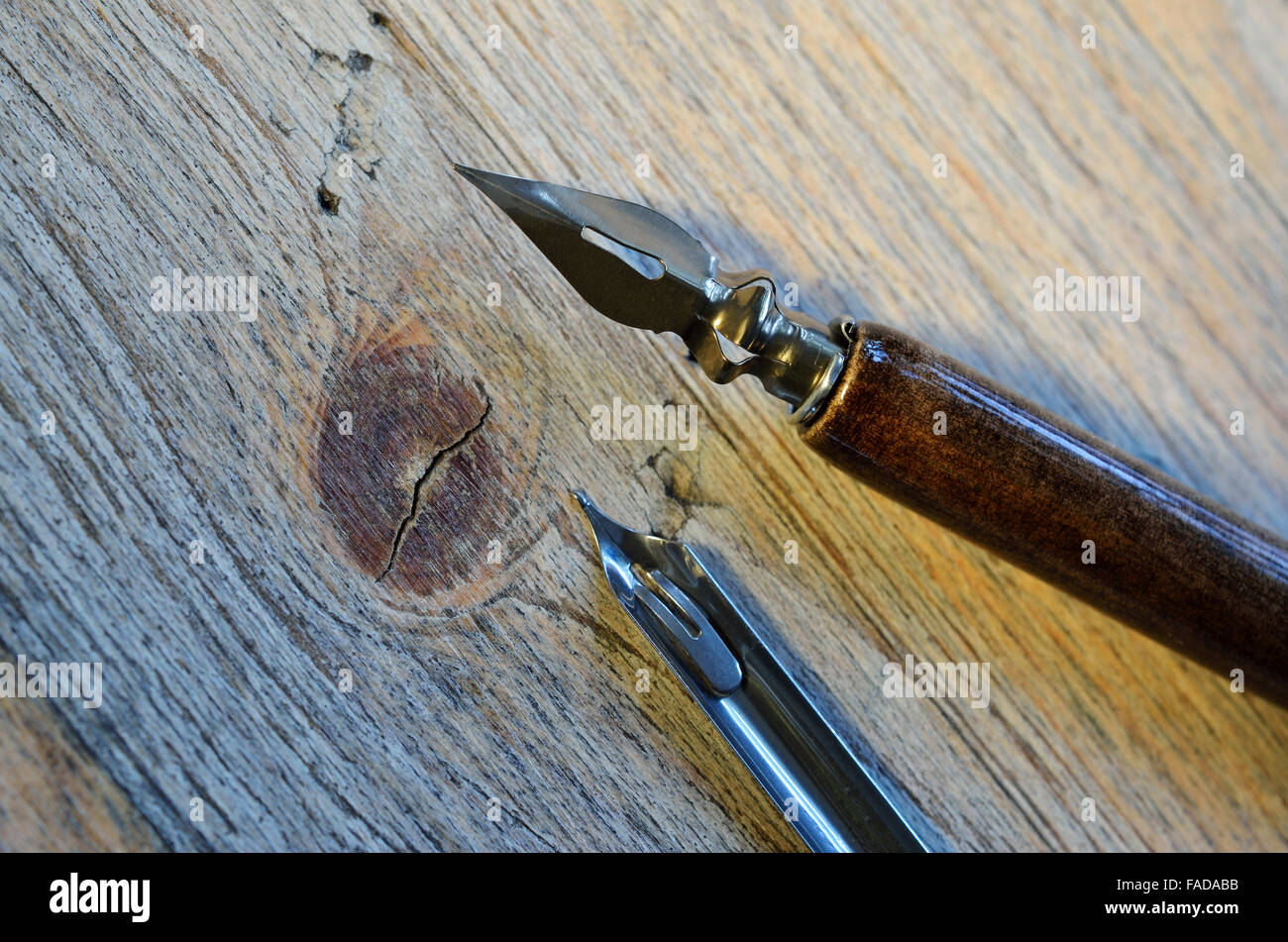 closeup of fountain pen on wooden background Stock Photo - Alamy