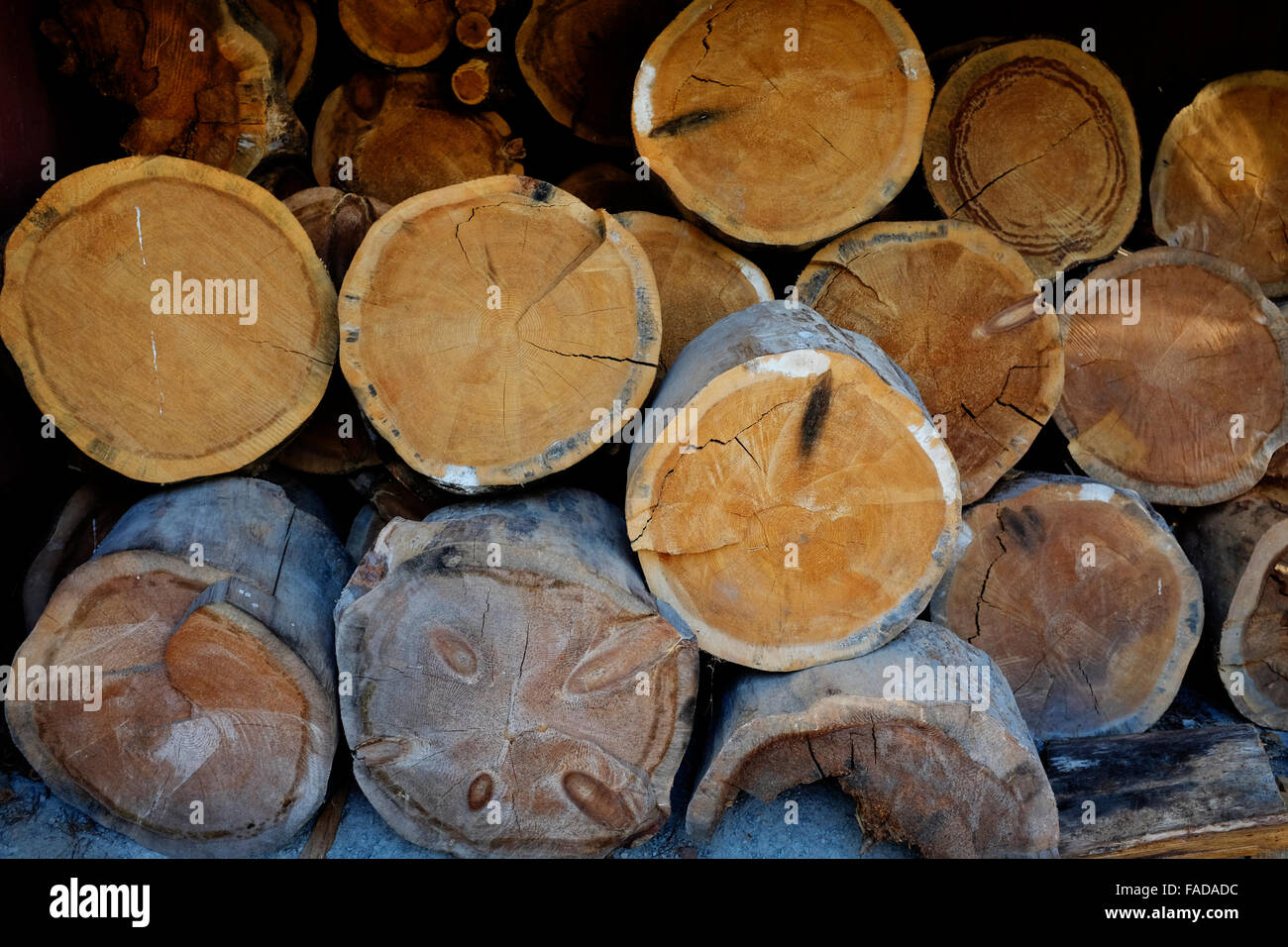 stack of firewood in rustic barn, horizontal Stock Photo - Alamy