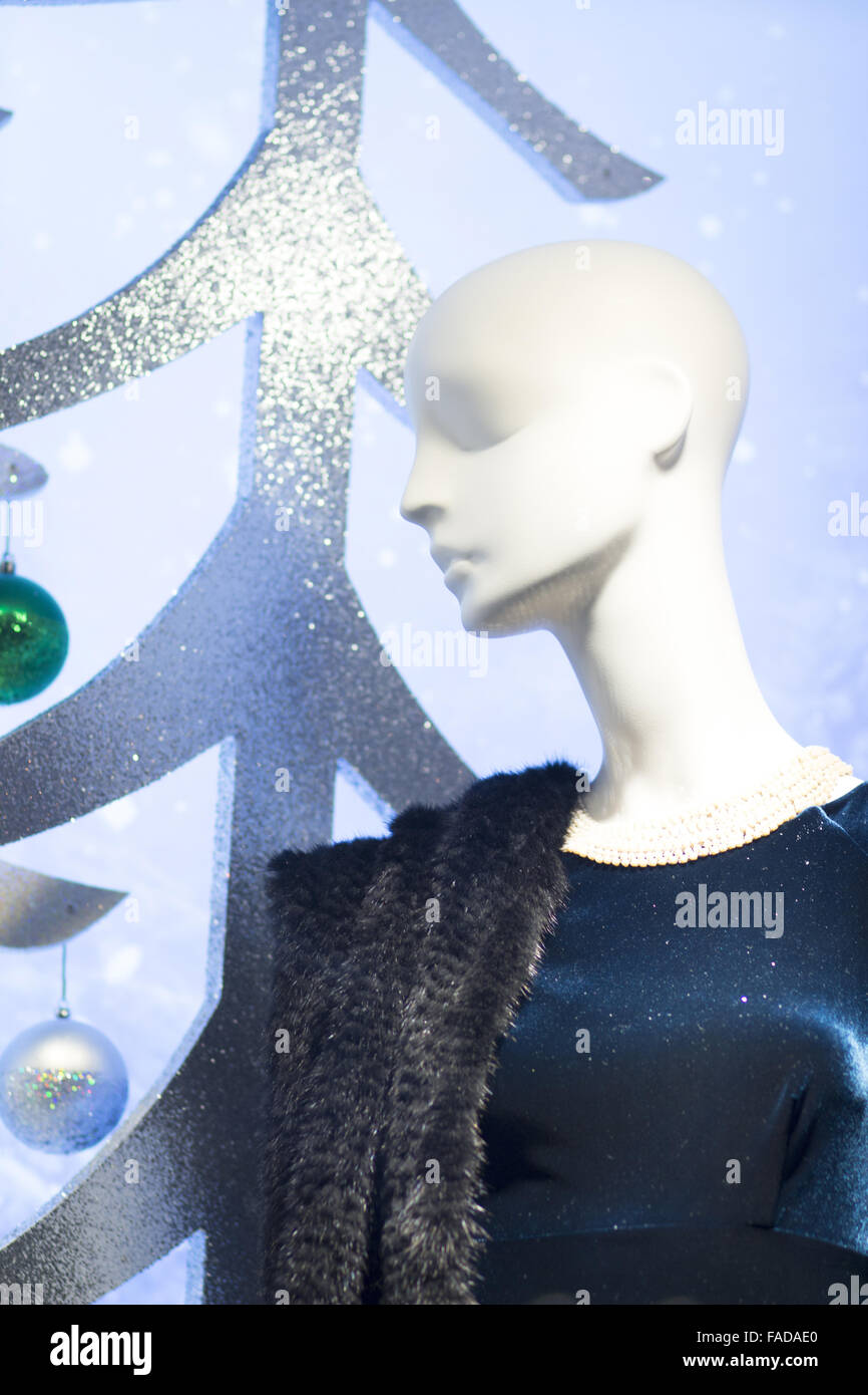 Female shop dummy fashion mannequin in department store boutique window ...