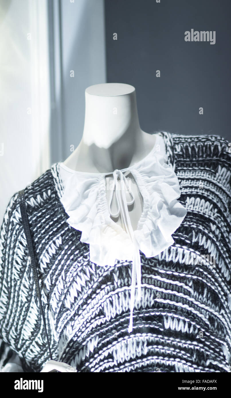 Female shop dummy fashion mannequin in department store boutique window ...