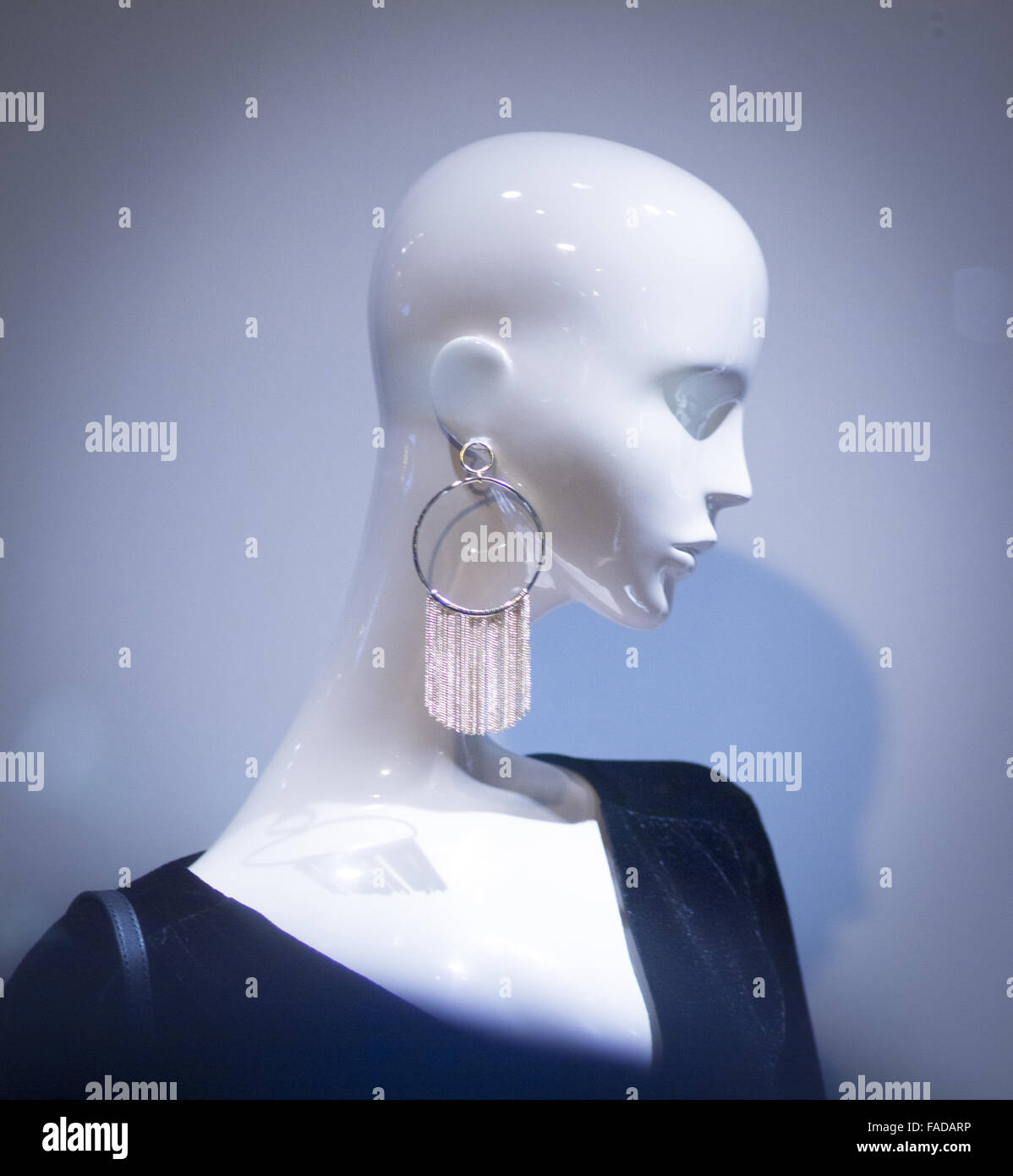 Female shop dummy fashion mannequin in department store boutique window ...