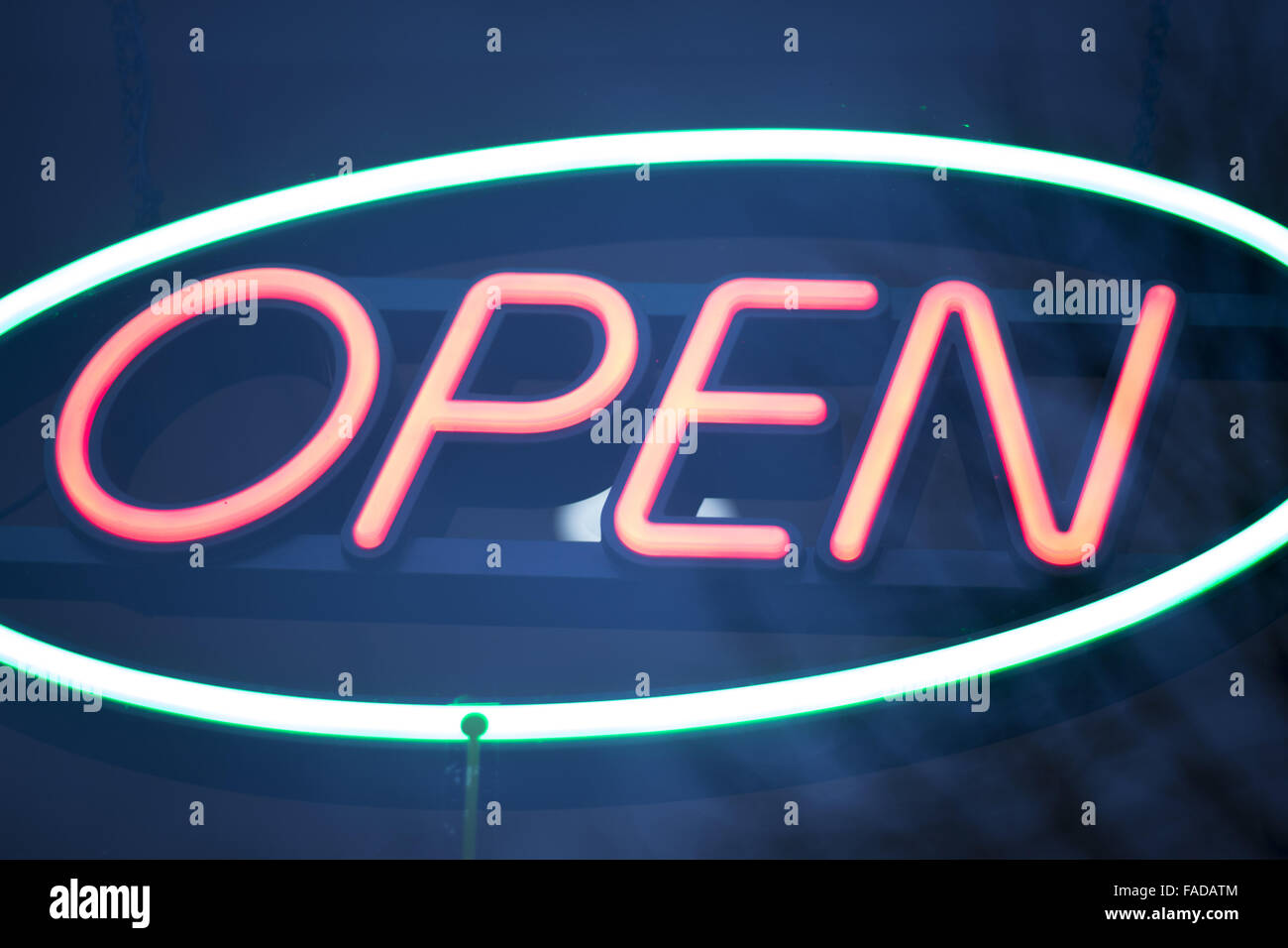 Neon shop open store sign at night in street photograph Stock Photo - Alamy