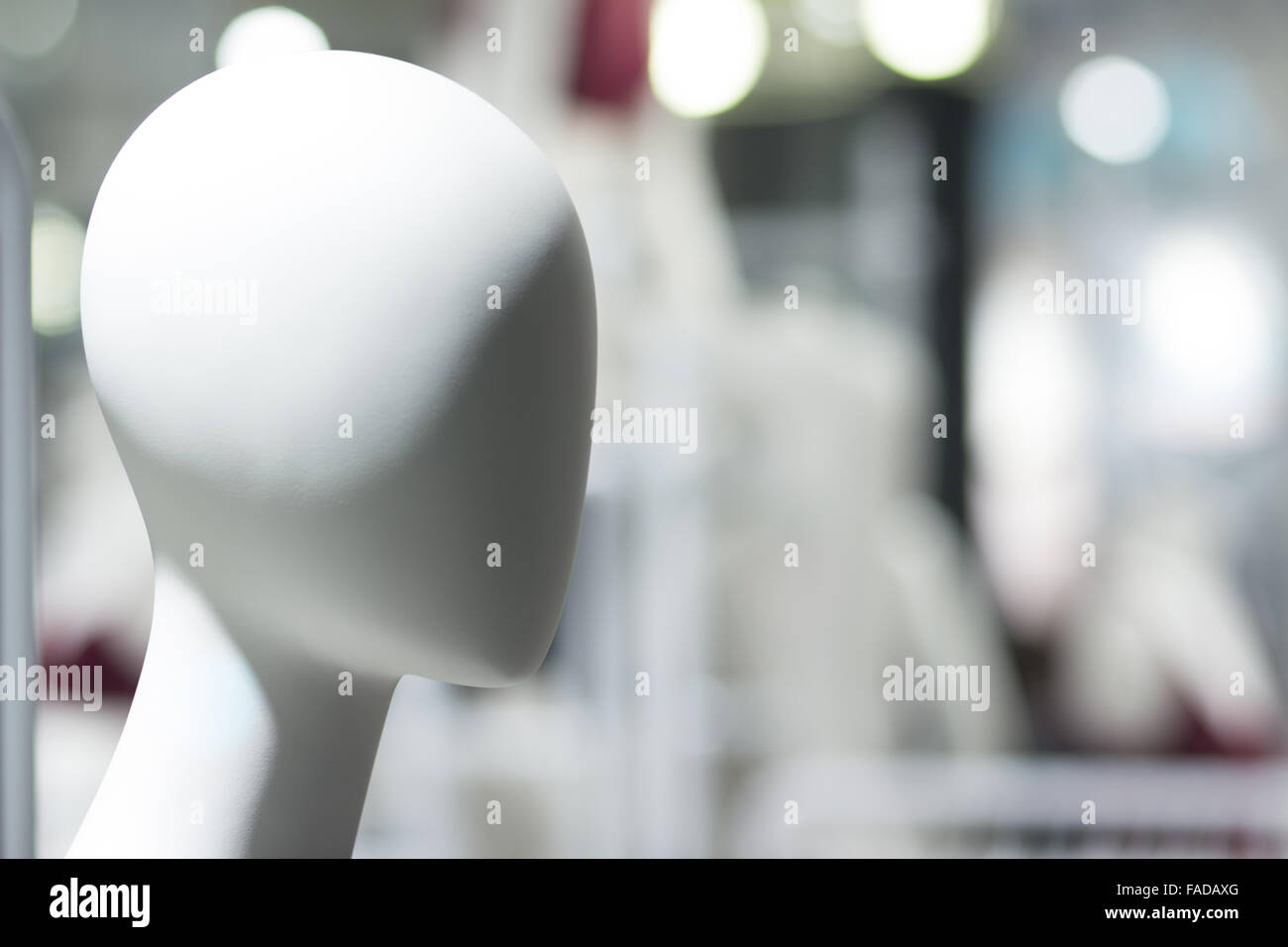 Female shop dummy fashion mannequin in department store boutique window ...
