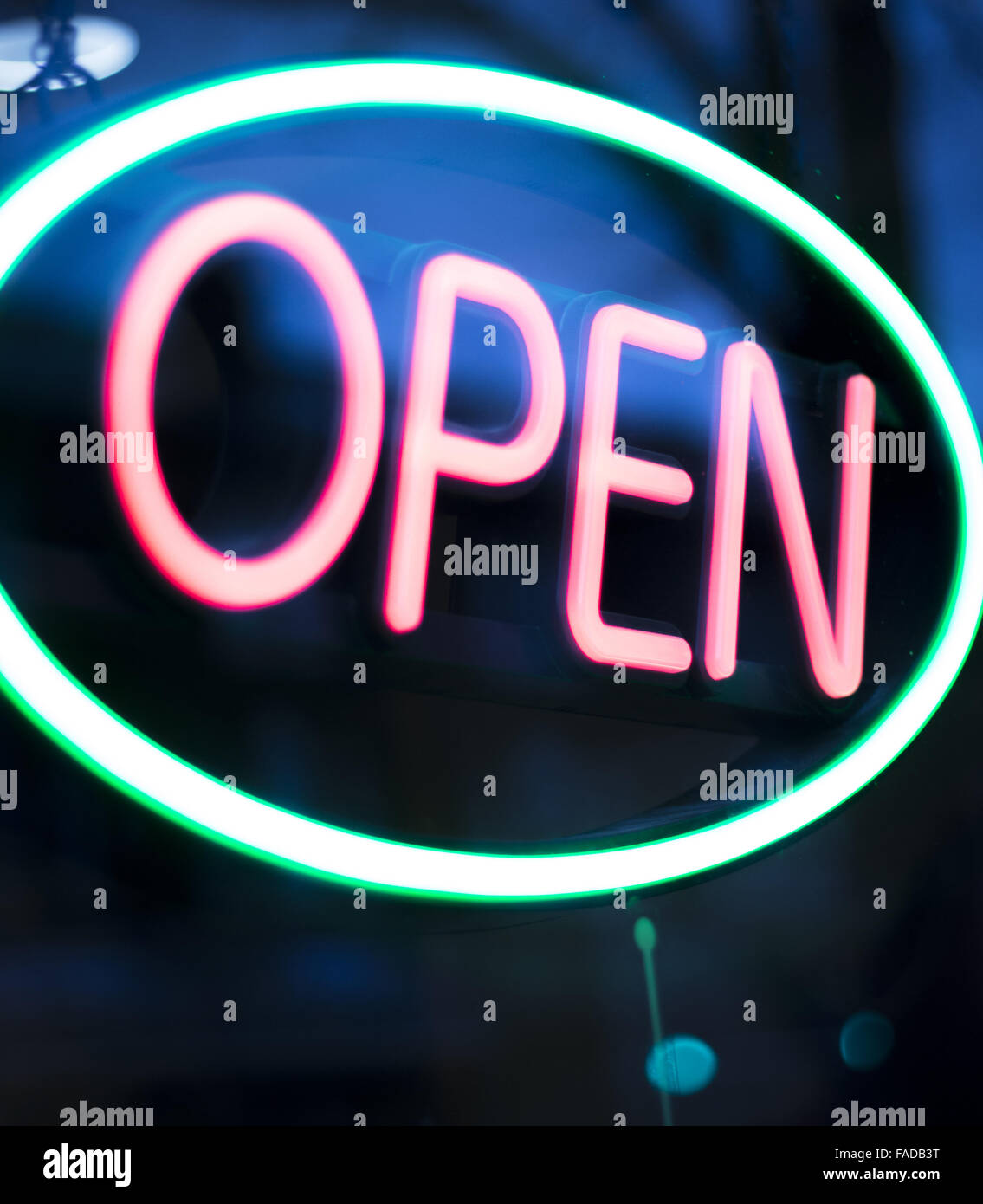 Neon shop open store sign at night in street photograph Stock Photo - Alamy