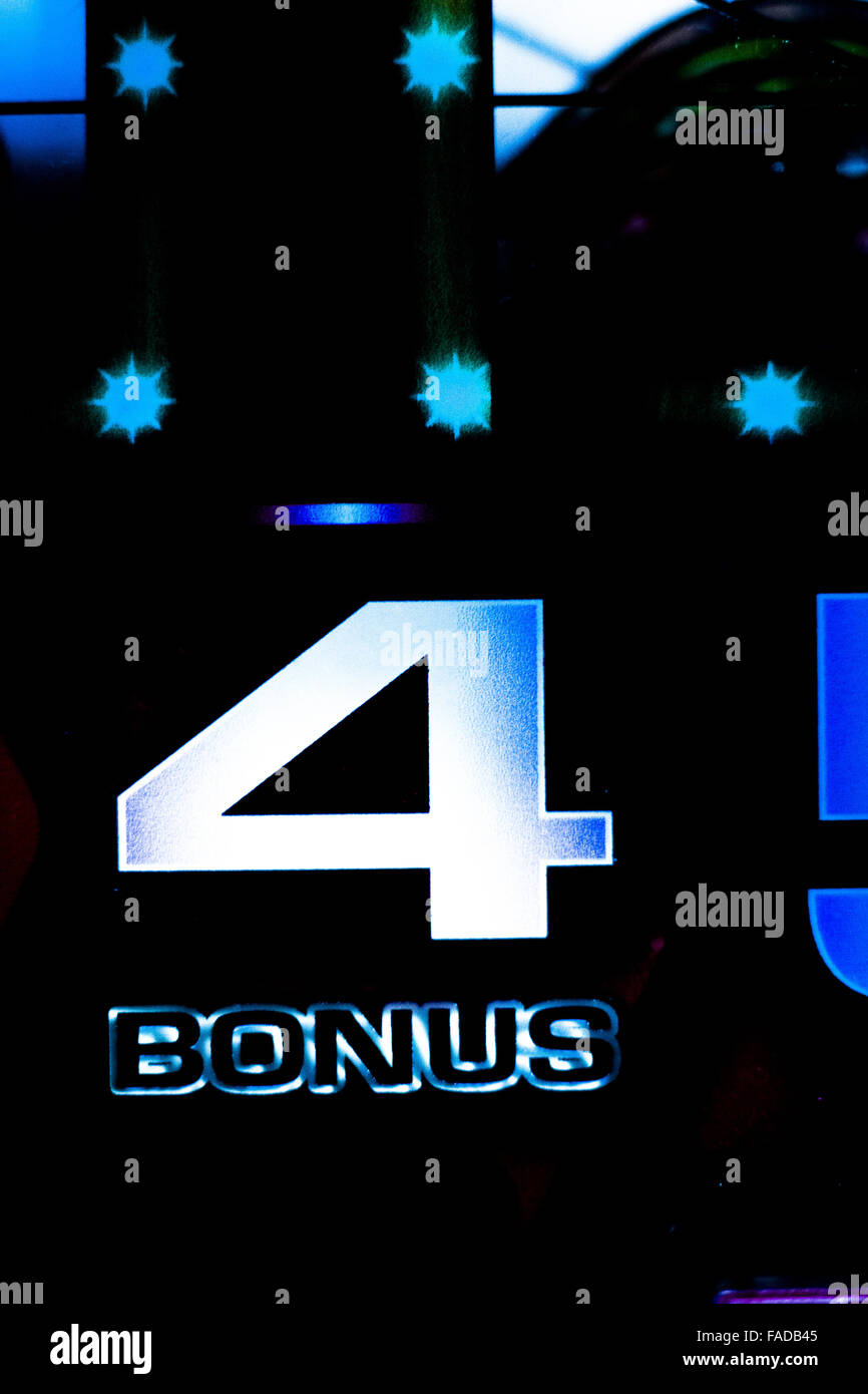 One arm bandit slot machine reels showing numbers in casino at night ...