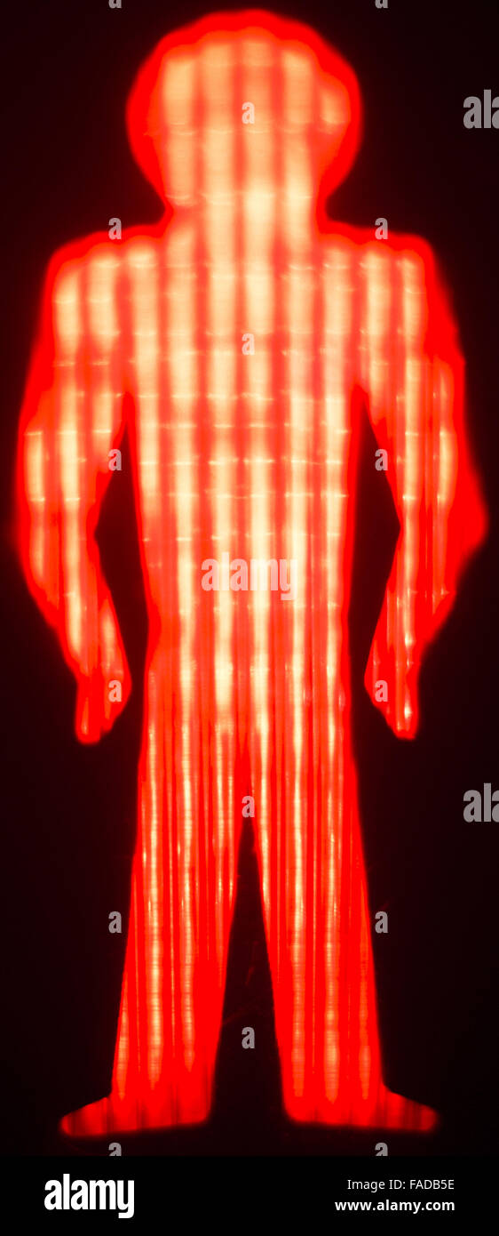 Green man go pedestrian traffic light sign Stock Photo - Alamy