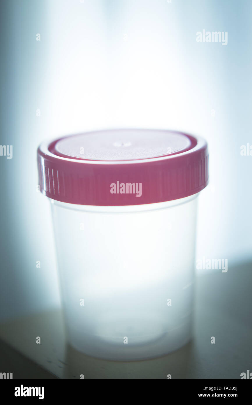 Urine sample plastic beaker for urine testing for drugs and illness ...