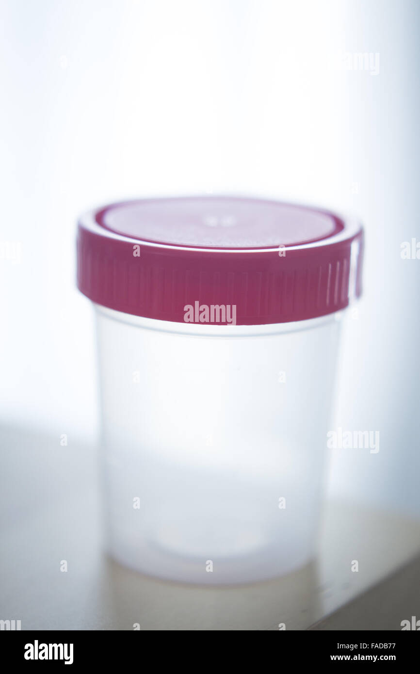 Urine sample plastic beaker for urine testing for drugs and illness ...