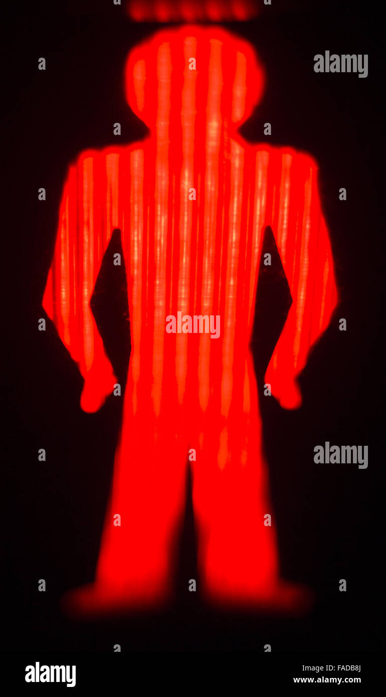 Green man go pedestrian traffic light sign Stock Photo - Alamy