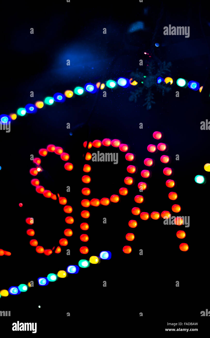 Health spa neon light sign at night photo Stock Photo - Alamy