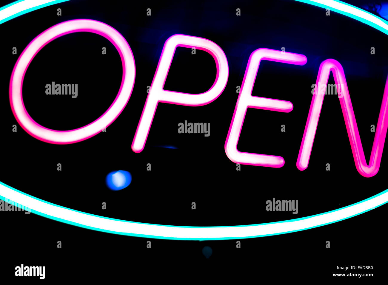 Neon shop open store sign at night in street photograph Stock Photo - Alamy