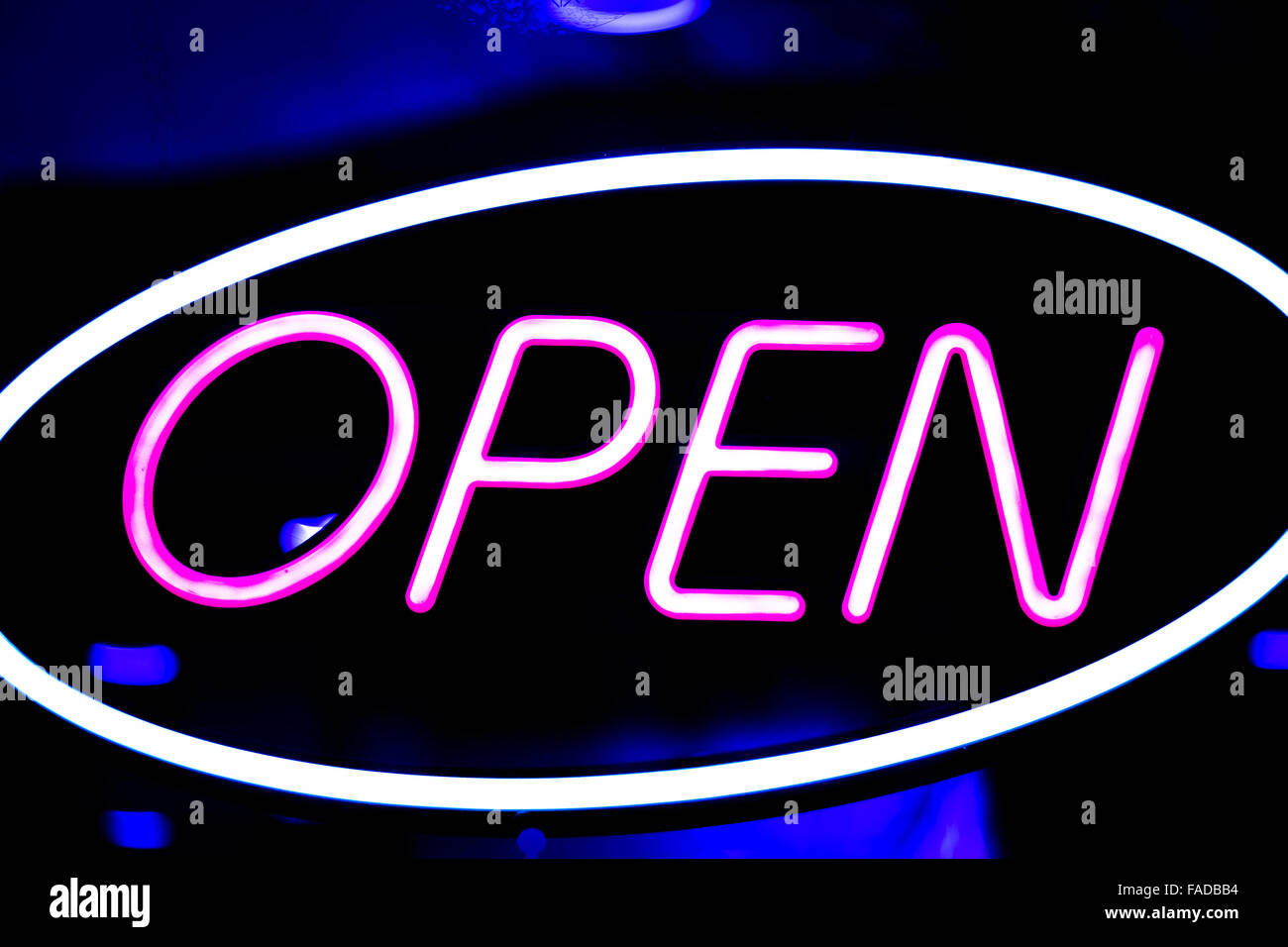Neon shop open store sign at night in street photograph Stock Photo - Alamy