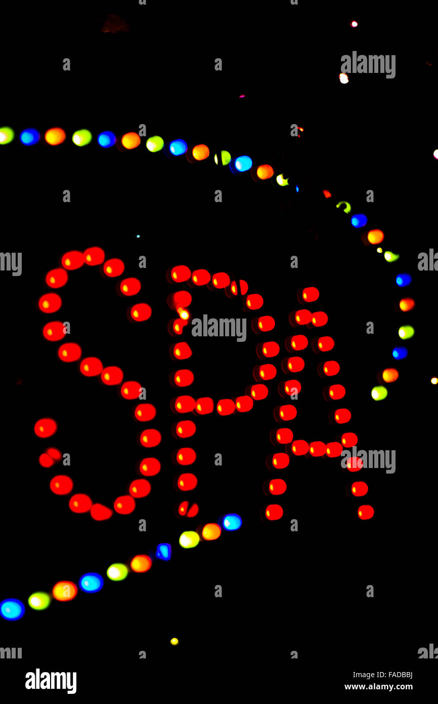 Health spa neon light sign at night photo Stock Photo - Alamy