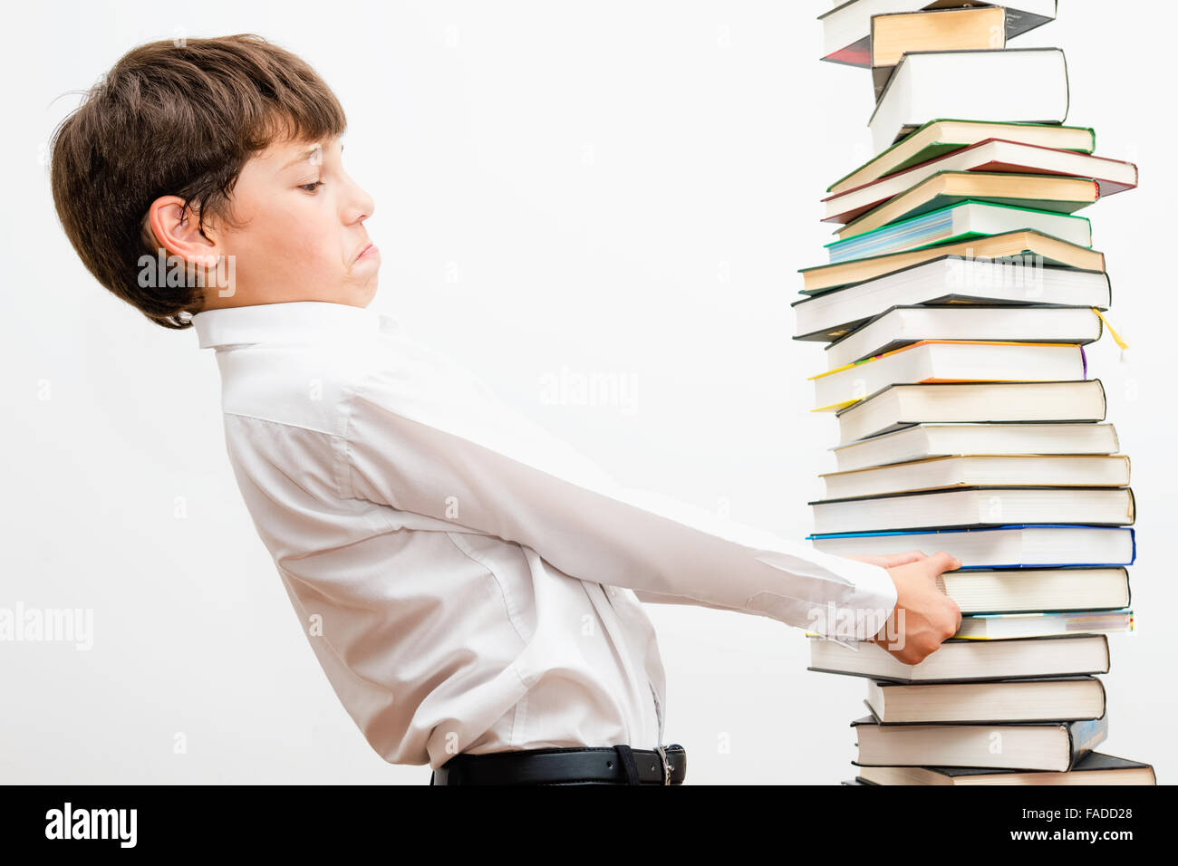 Portrait of a boy with books Stock Photo - Alamy