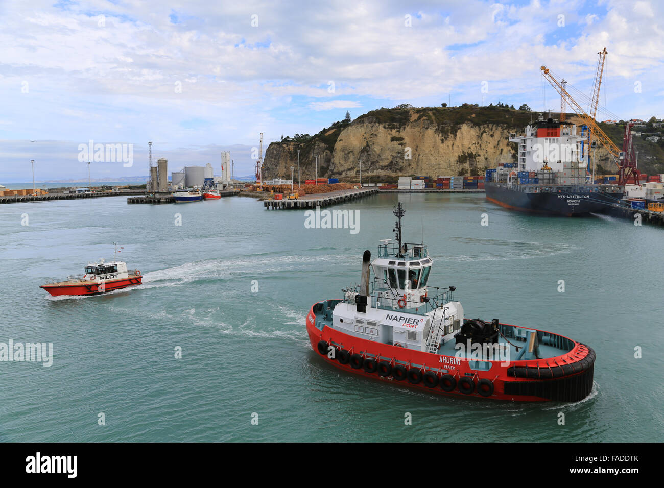 Napier Port tug Ahuriri and pilot boat maneuver in the harbour with the ...