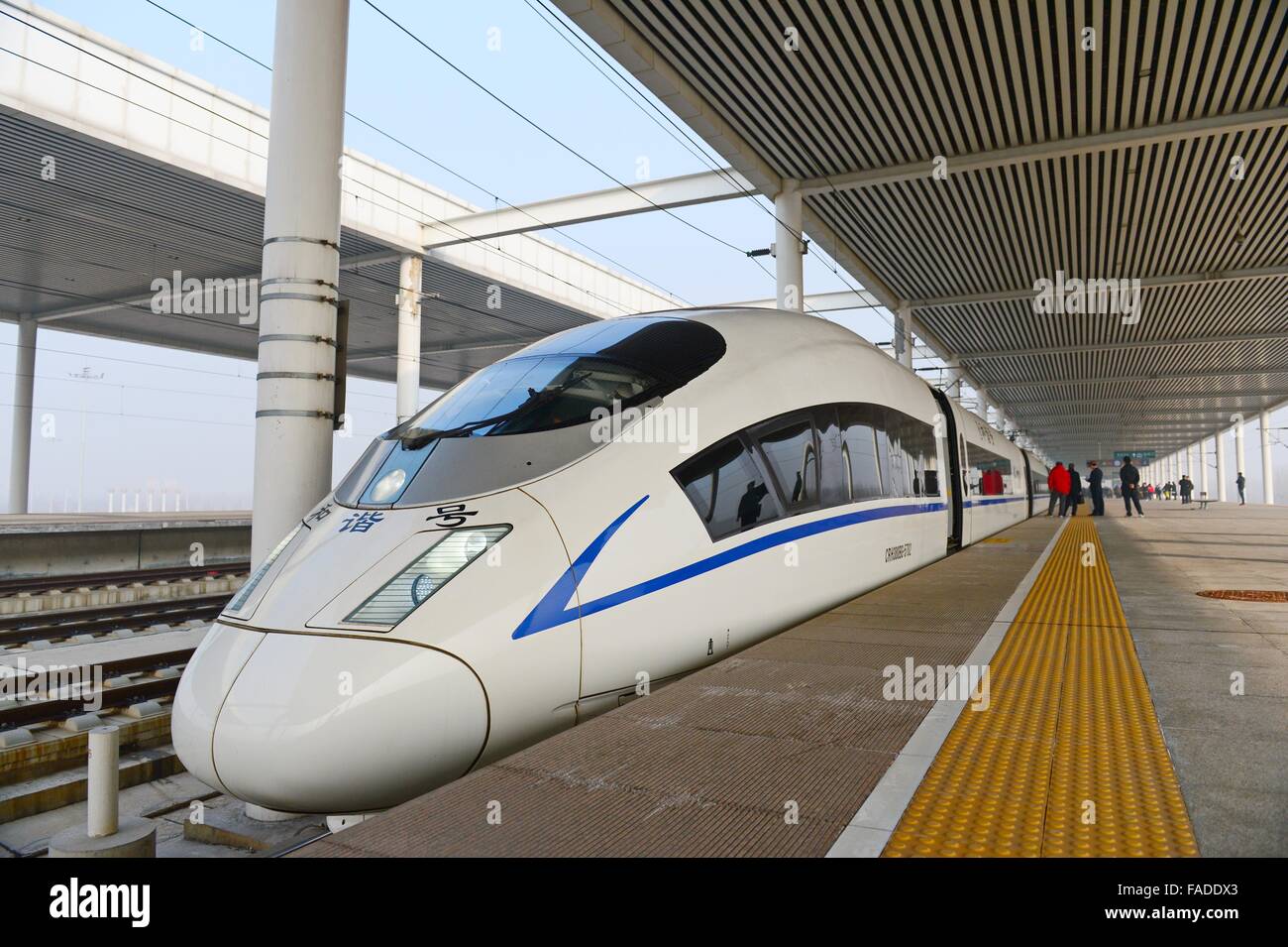 Baoding, China's Hebei Province. 28th Dec, 2015. Train G6279 stops at ...