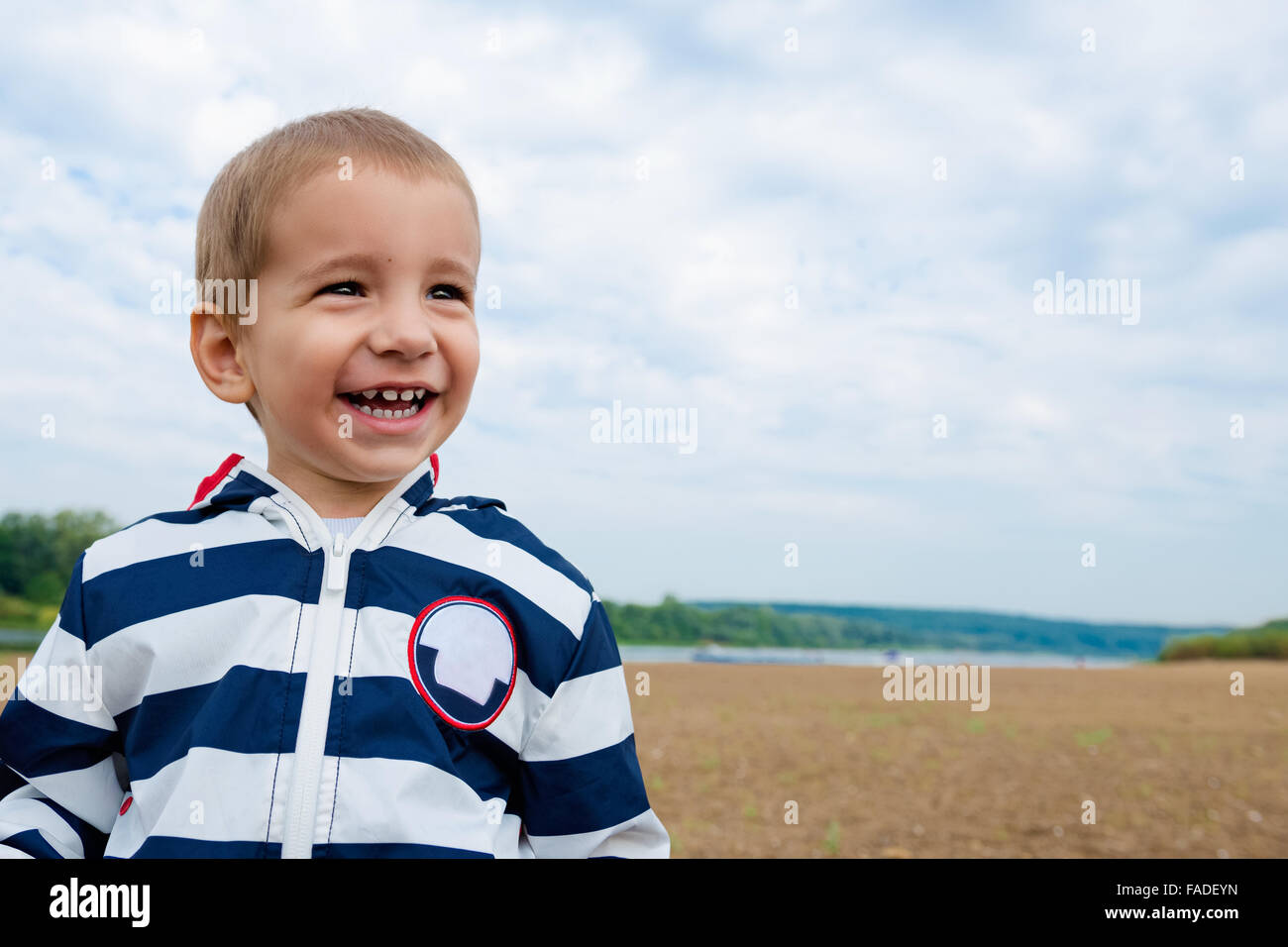 Portrait of a cheerful child on the nature Stock Photo - Alamy