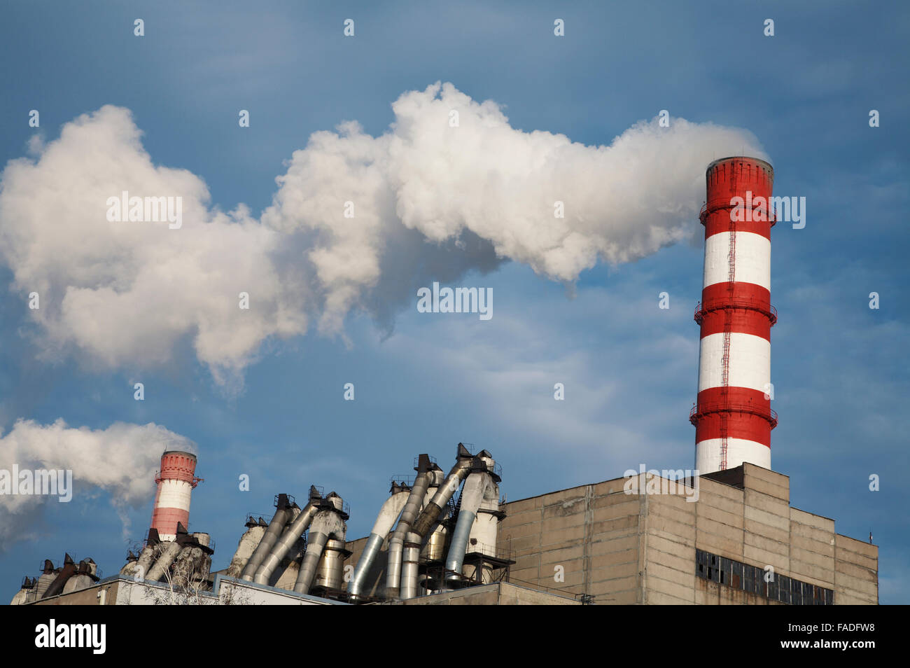 Smoke billowing from tall stacks Stock Photo - Alamy