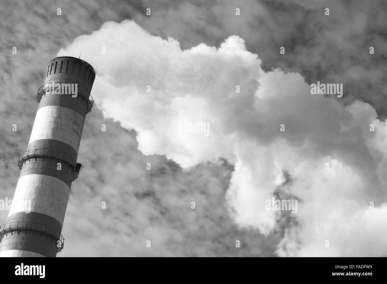 Smoke billowing from tall stacks Stock Photo - Alamy