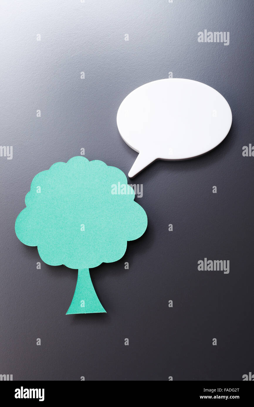 speech bubble and paper tree Stock Photo - Alamy